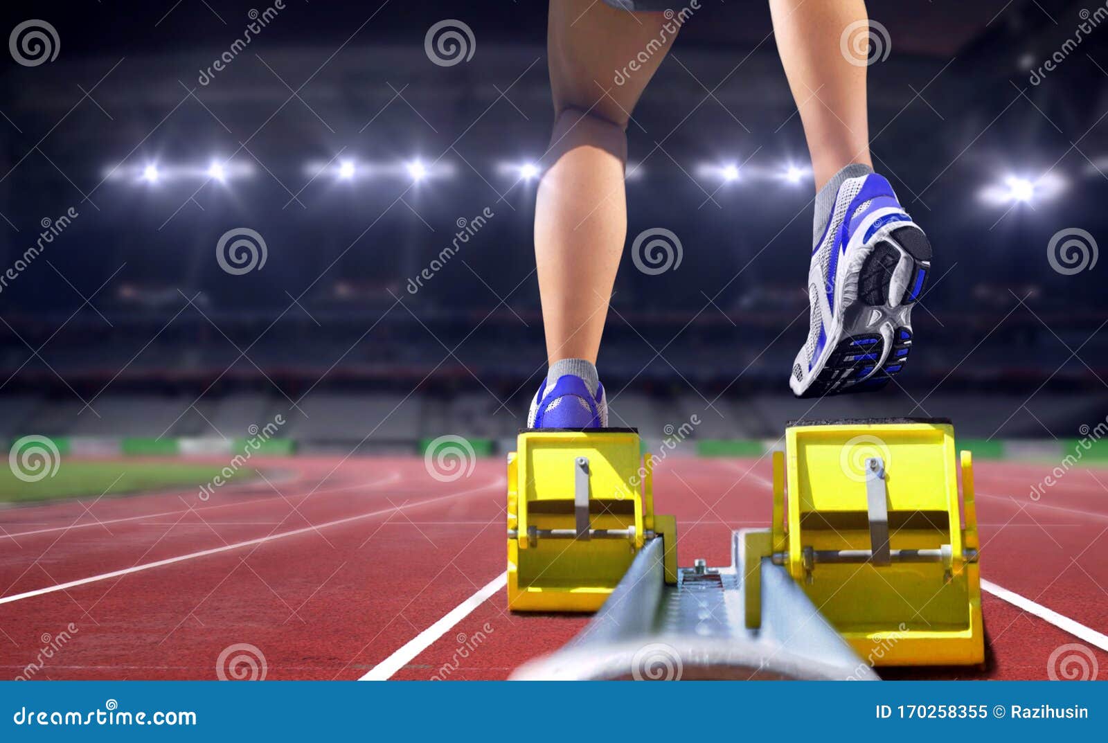 Sprinter Athlete Launching Off from the Start Line in a Race Stock ...