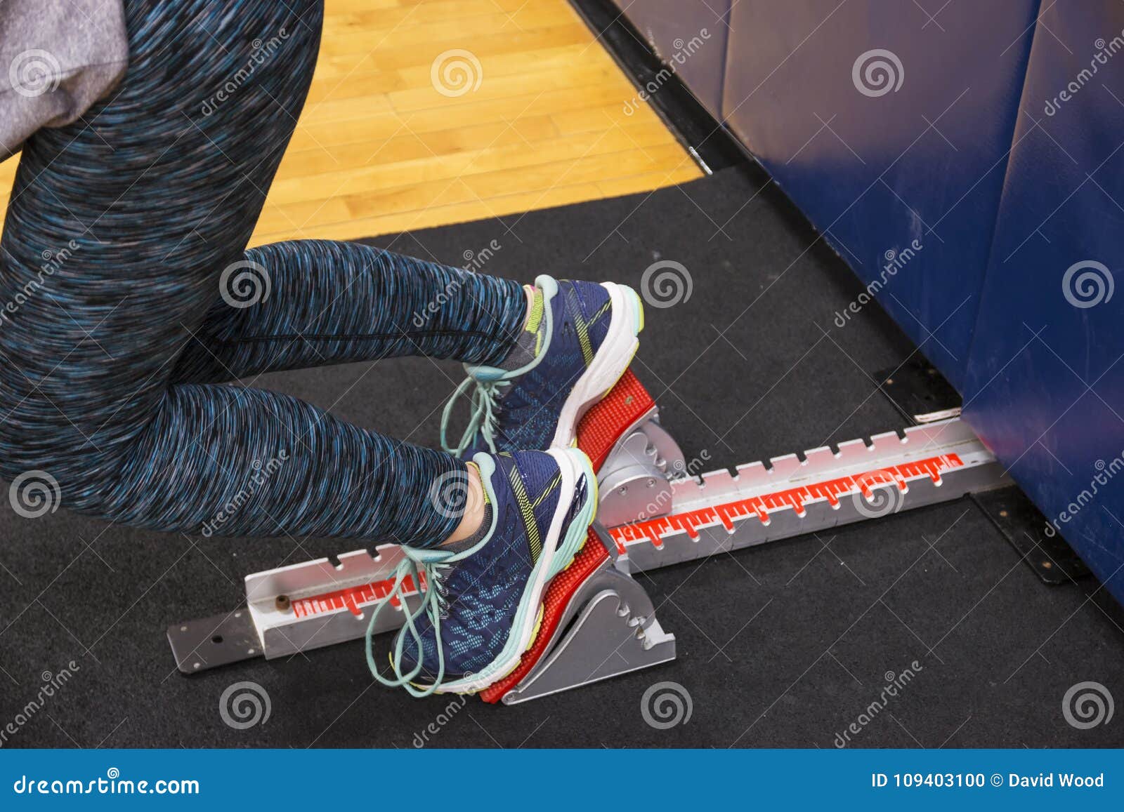 Sprinter in the Blocks for Speed Training Indoor in the Gym Stock Photo ...