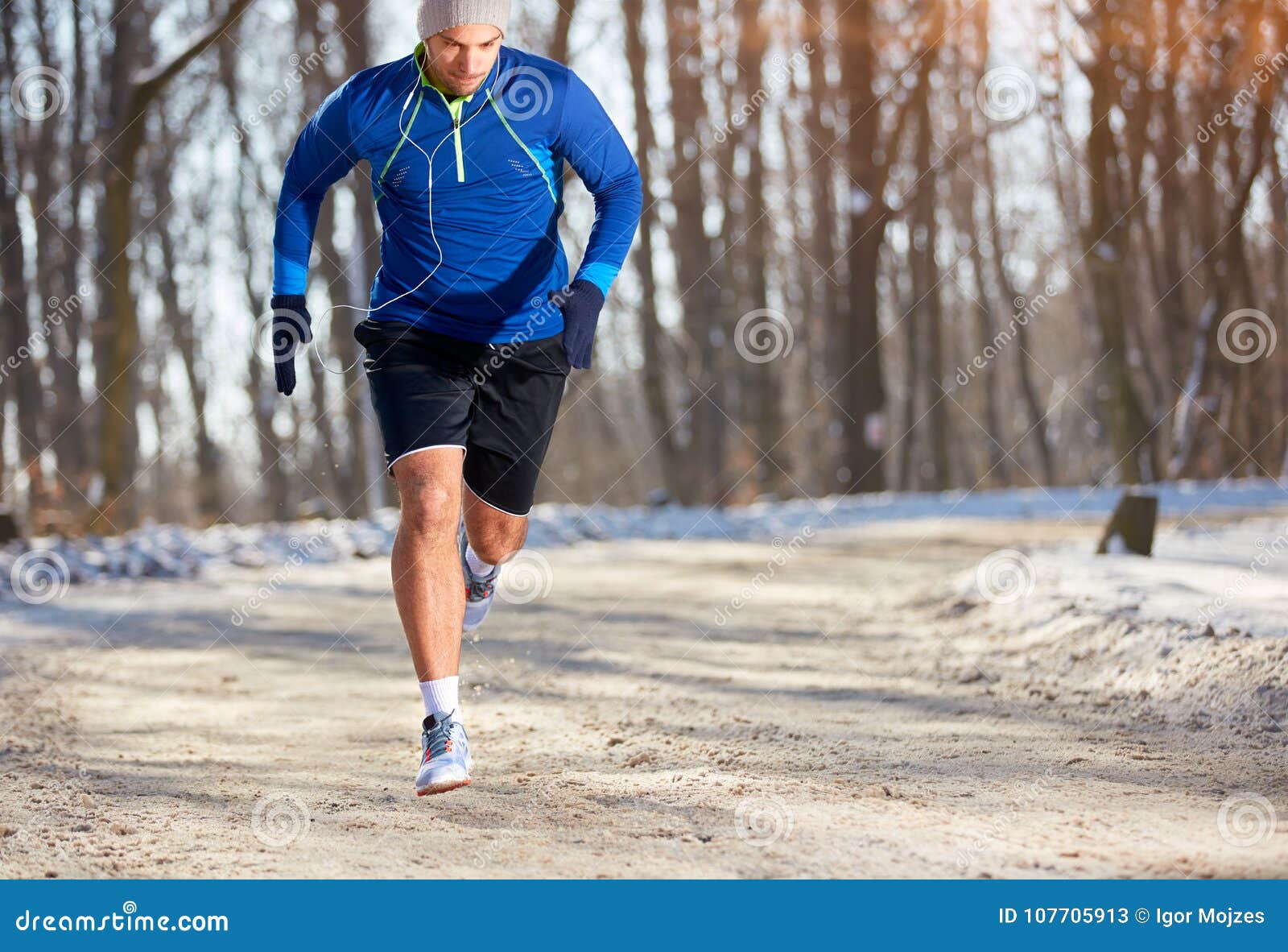 Sprinter running in nature stock image. Image of male - 107705913