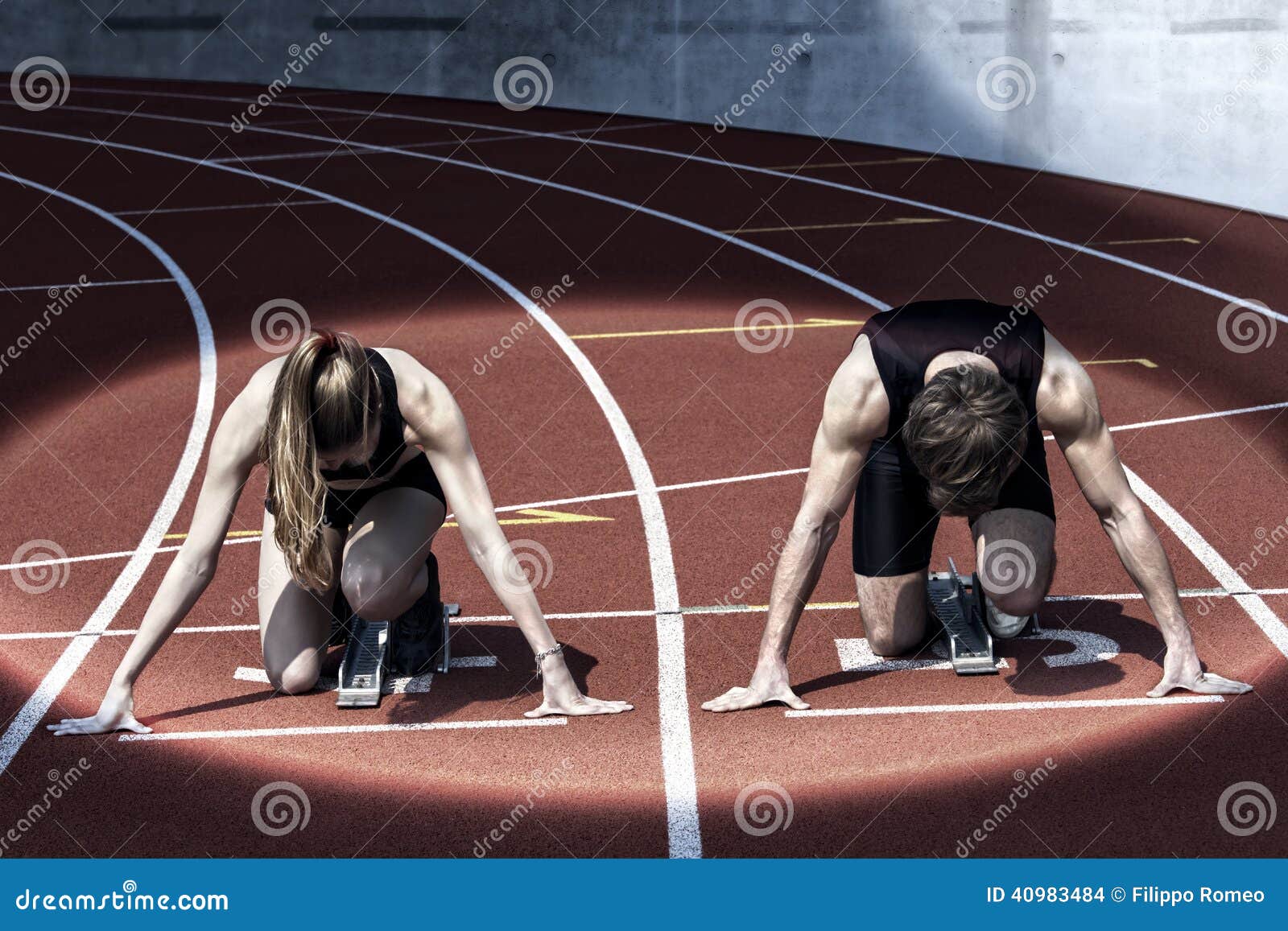 Sprinter start spotlight stock photo. Image of person - 40983484