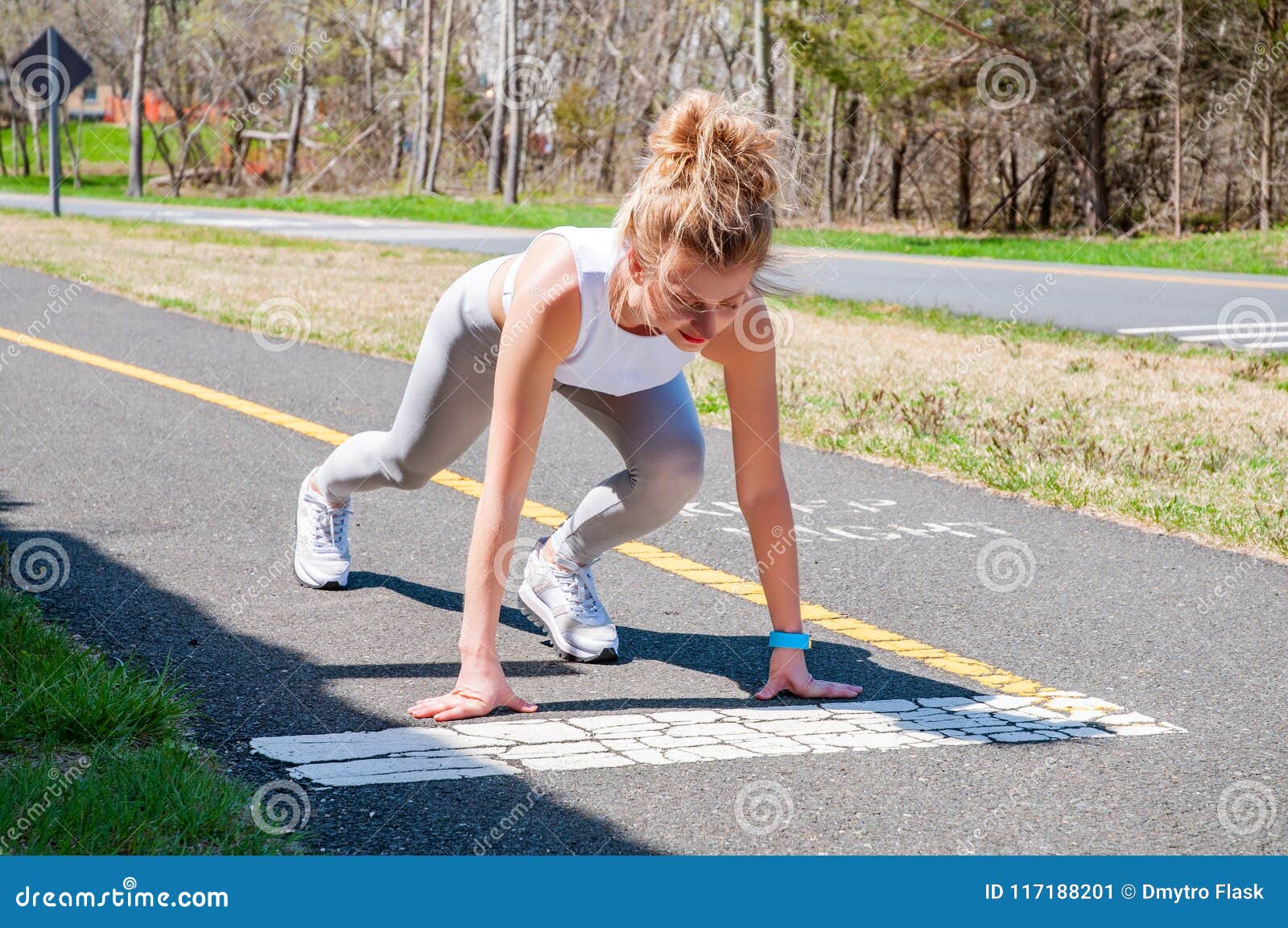 Sprinter Woman Getting Ready To Start on the Running Track Stock Image ... Sprinter Woman Getting Ready To Start on the Running Track Stock Image ...