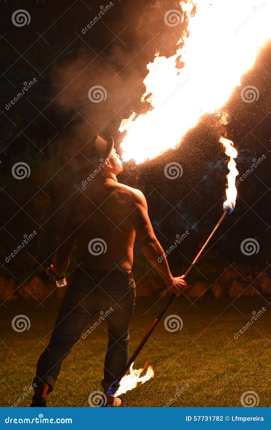 Sptting fire stock photo. Image of darkness, flame, shirtless - 57731782
