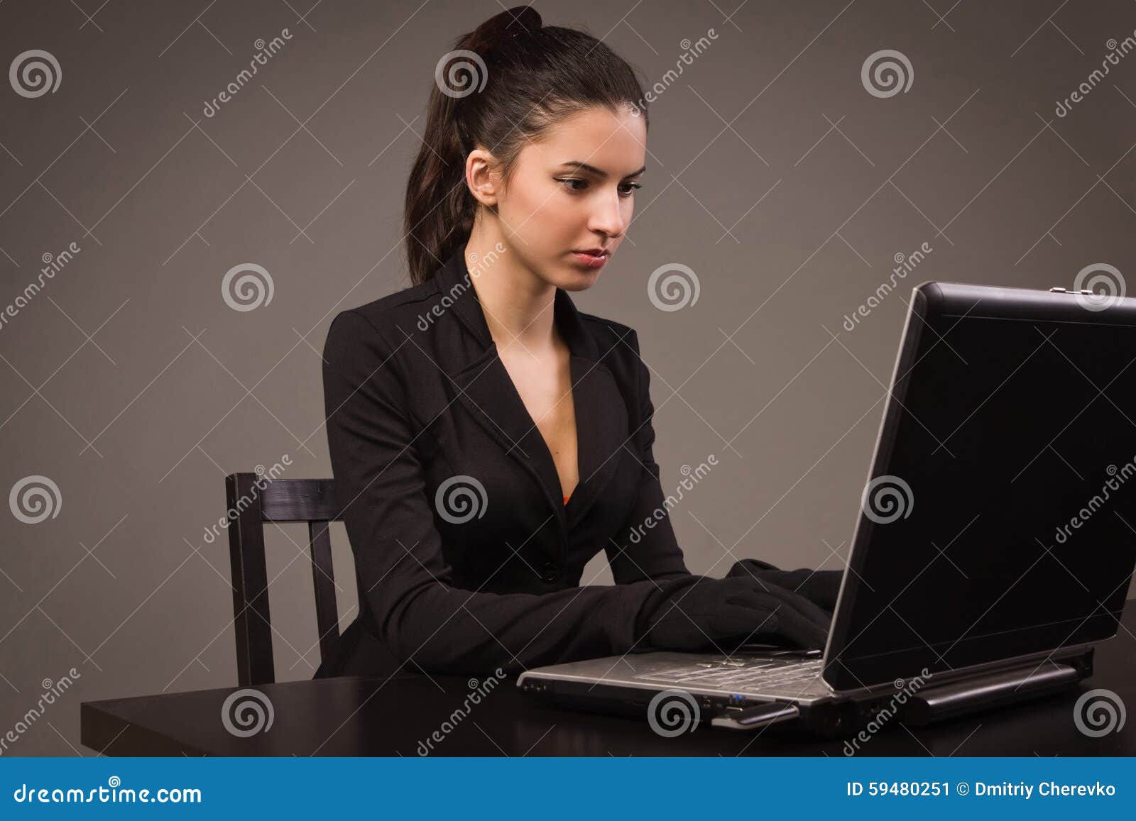Spy Girl in a Black with Laptop Stock Image - Image of senseless, pose ...