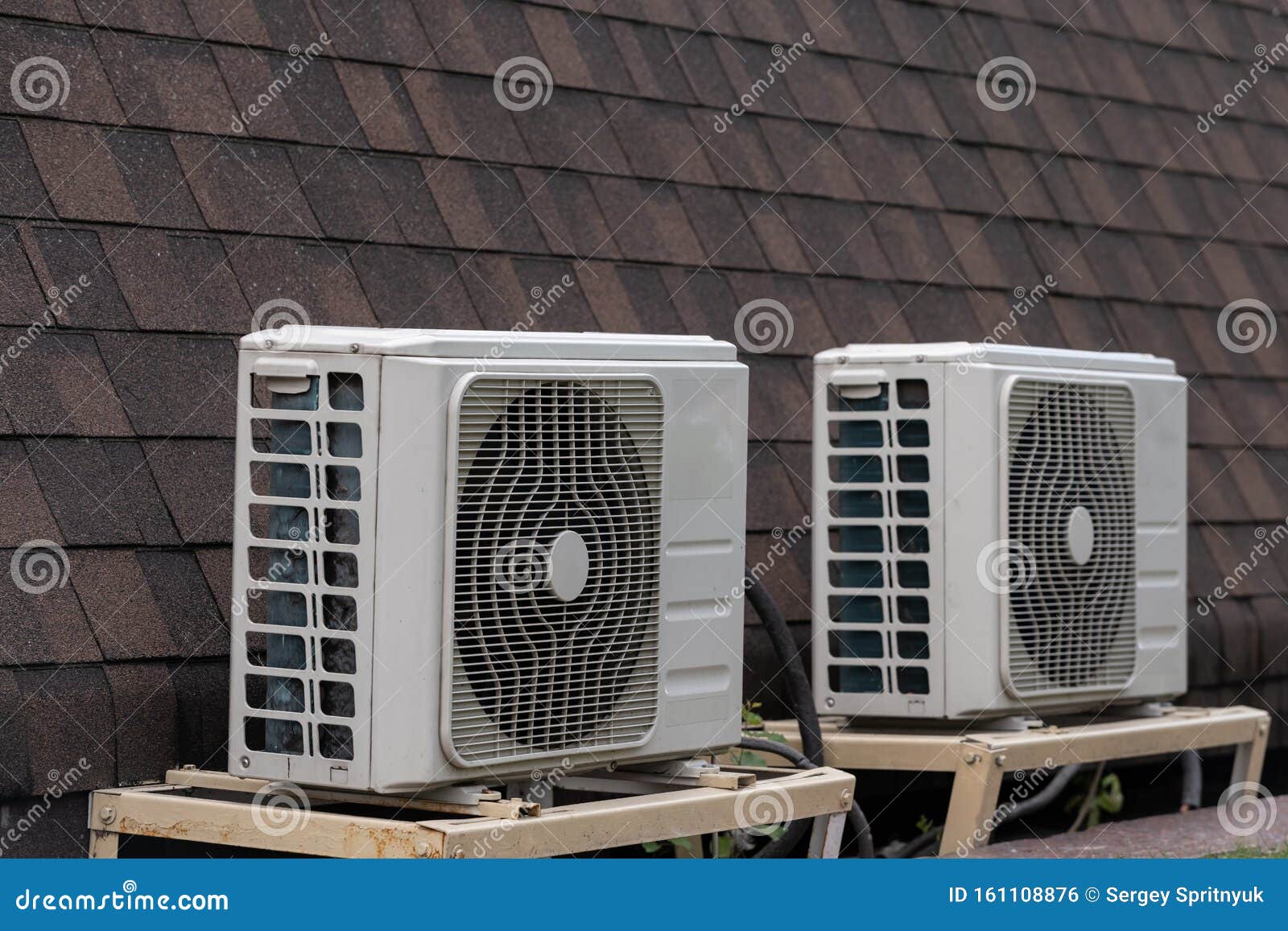 Square Air Conditioner on the Roof with a Round Fan Stock Photo - Image ...
