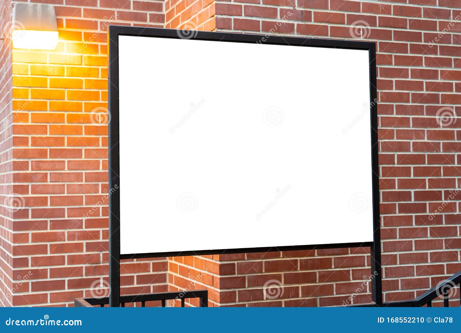 Square Billboard in Front of a Brick Wall Stock Photo - Image of show ...