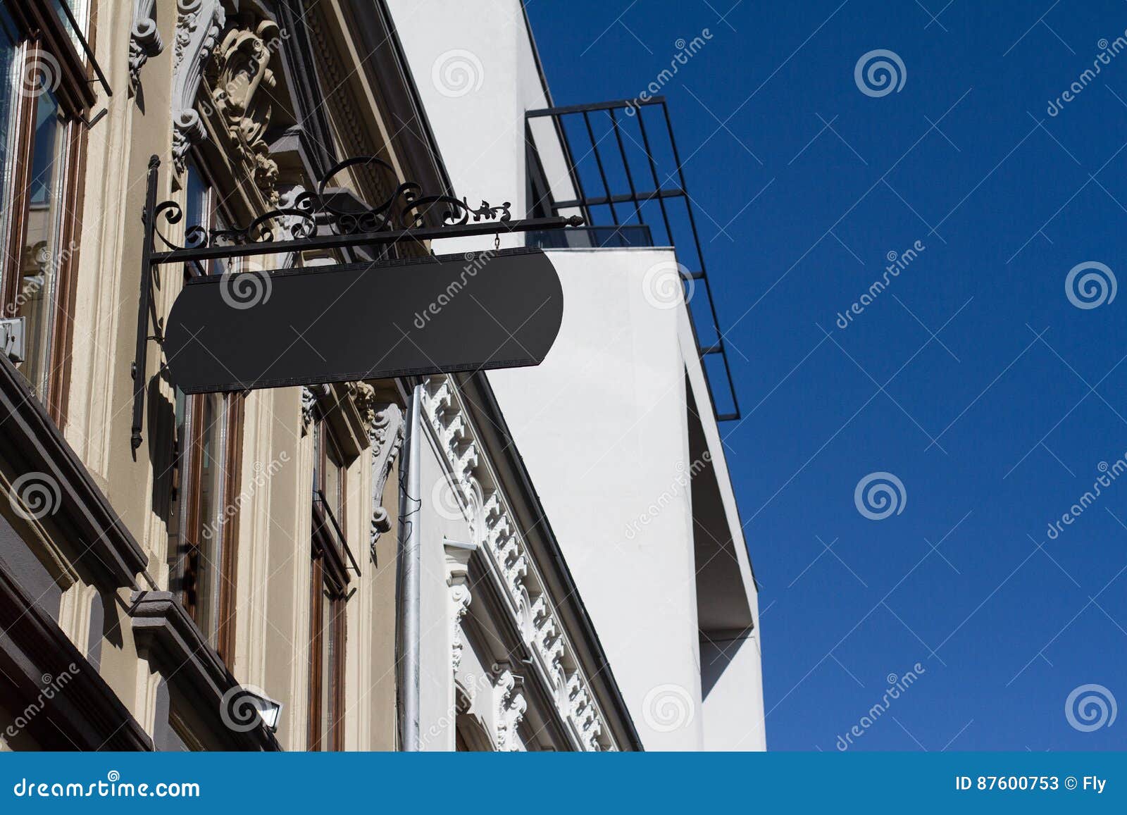 Square Black Signboard on a Building with Classical Architecture Stock ...