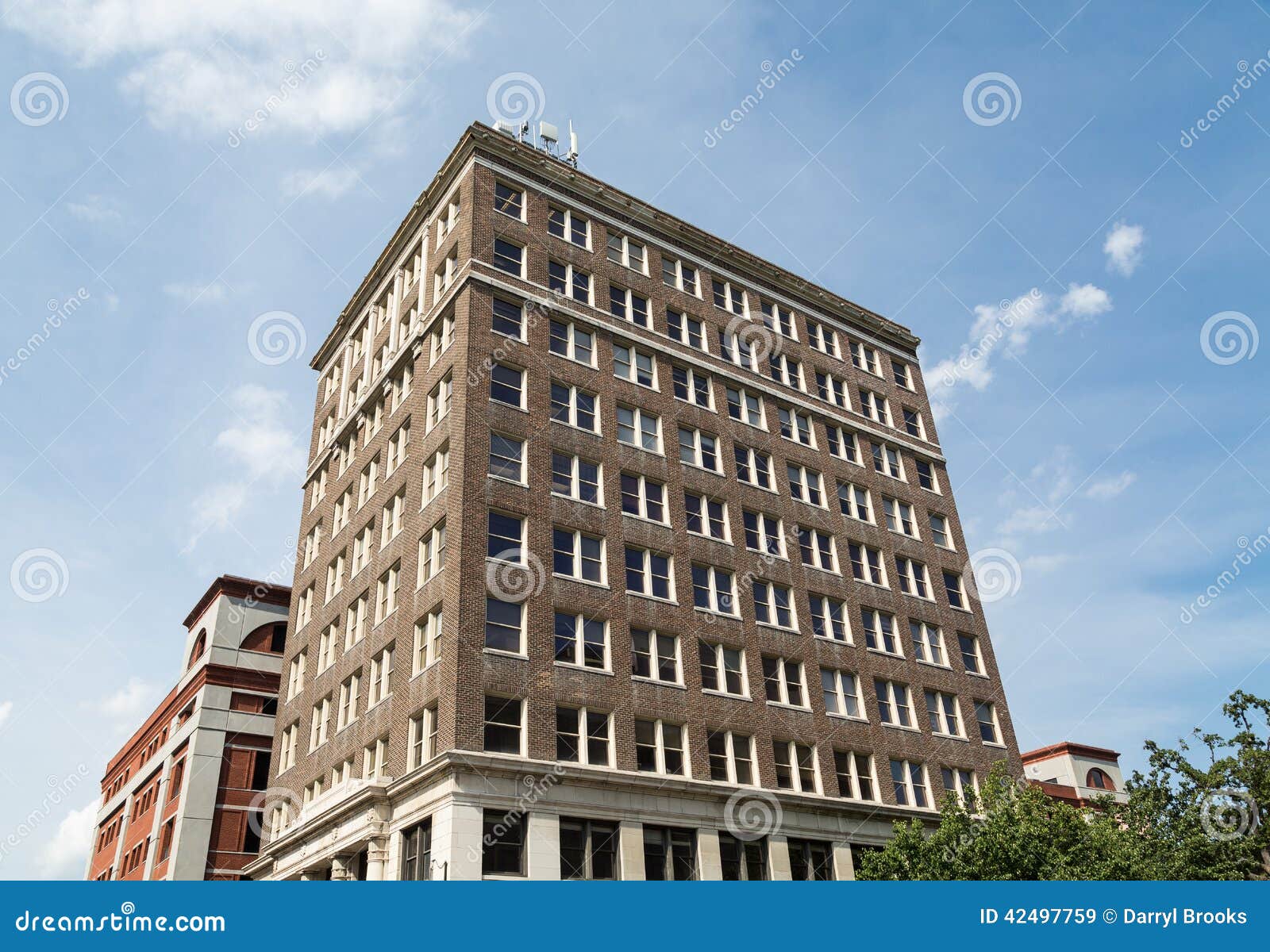 Square Brown Brick Building Under Nice Sky Stock Image - Image of ...