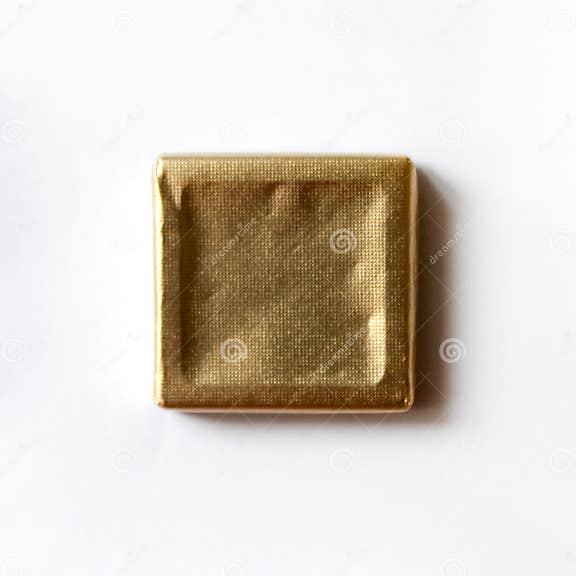 Square Chocolate Candy Wrapped in Golden Foil Isolated on White Surface ...
