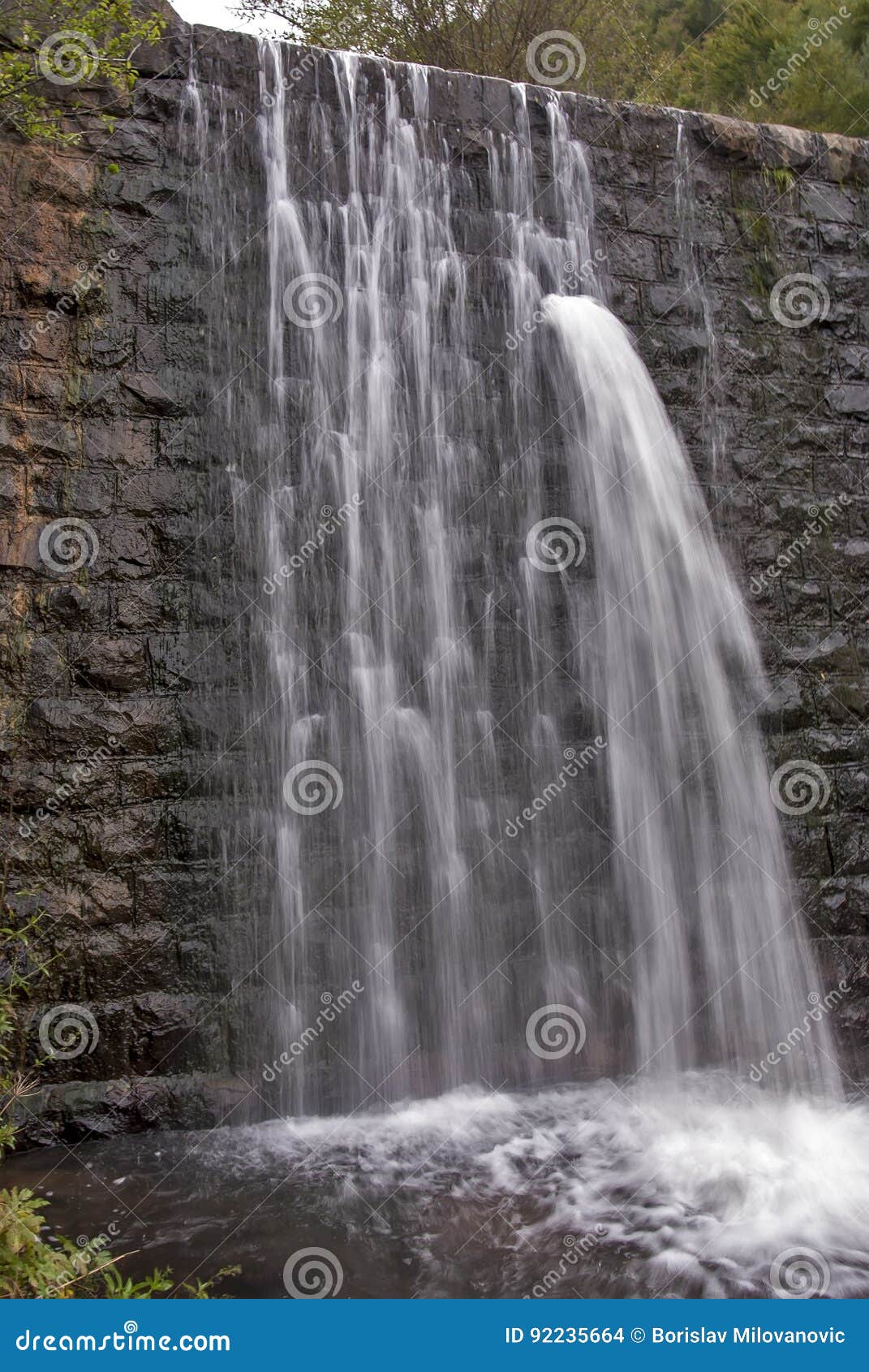 Square Concrete Blocks Dam on the River with Holes for Drain Water ...