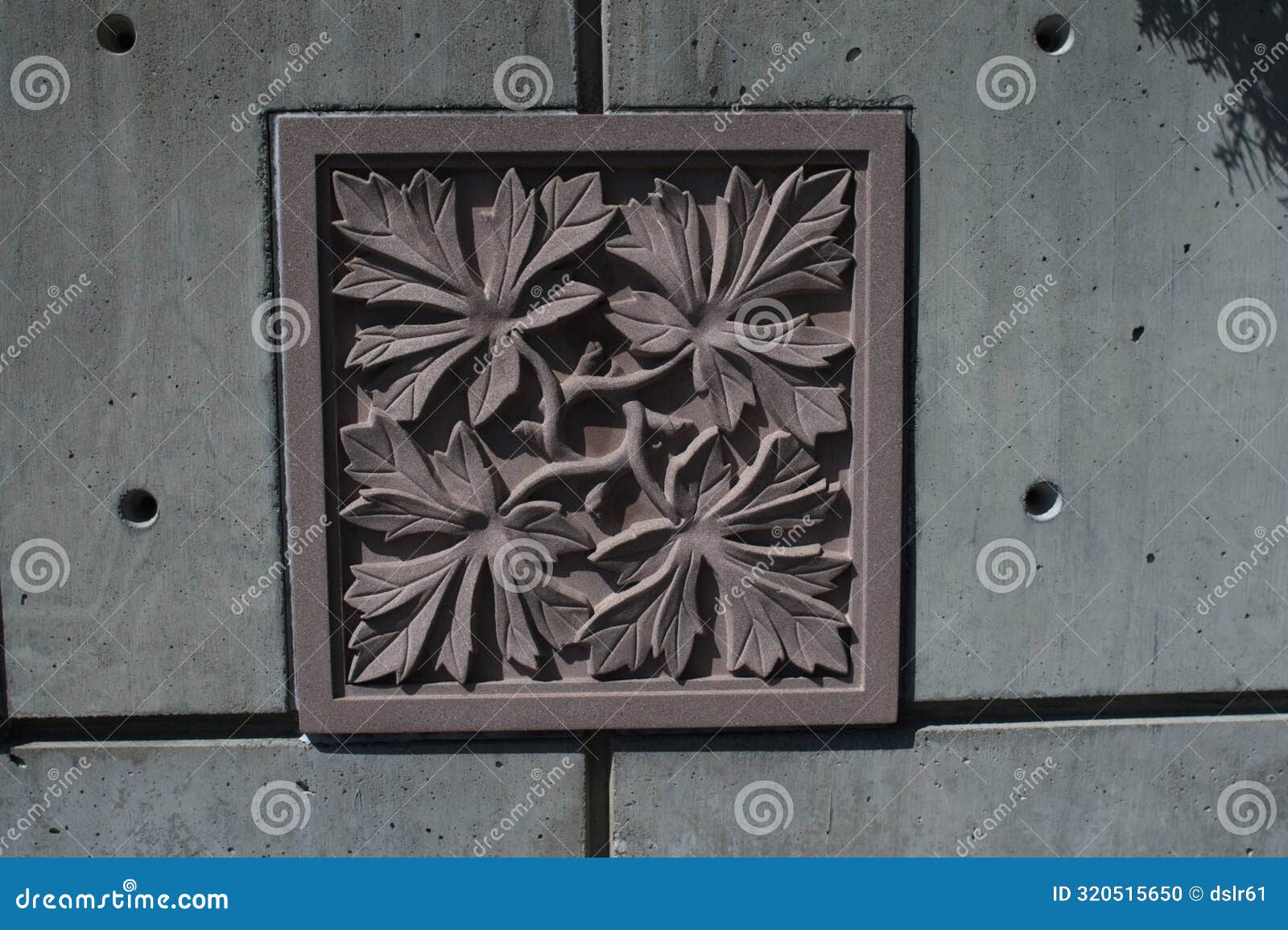 Decorative Stone Tile with Leaf Pattern on Concrete Wall Stock Photo ...