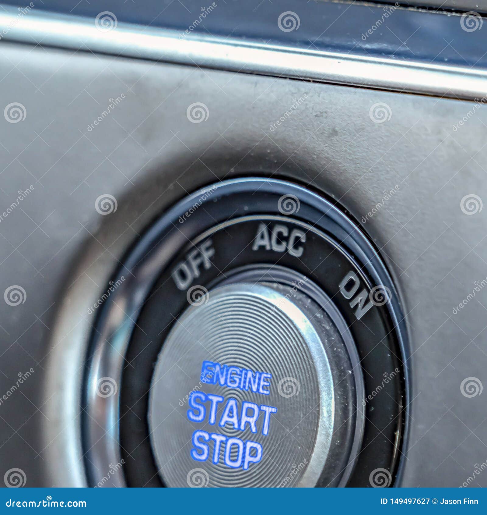 Square Frame Close Up View of an Engine Push Start and Stop Button ...