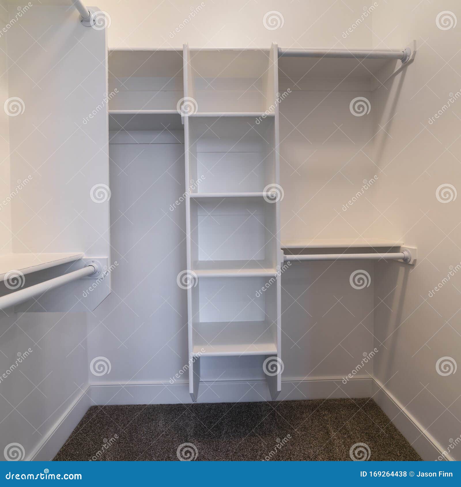 Square Frame Fitted Interior of a Walk-in Wardrobe Bright Interior ...