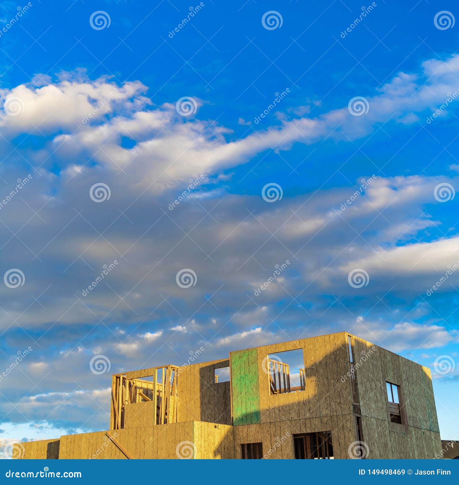 Square Frame Framework of a House Under Construction Viewed on a Bright ...