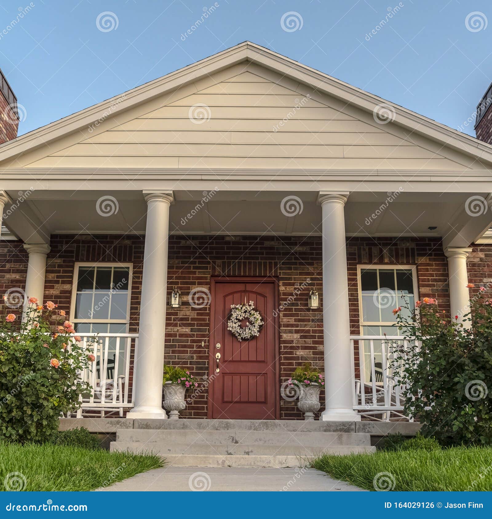 Square Frame Front Facade of a Modern House with Pillars Stock Photo ...