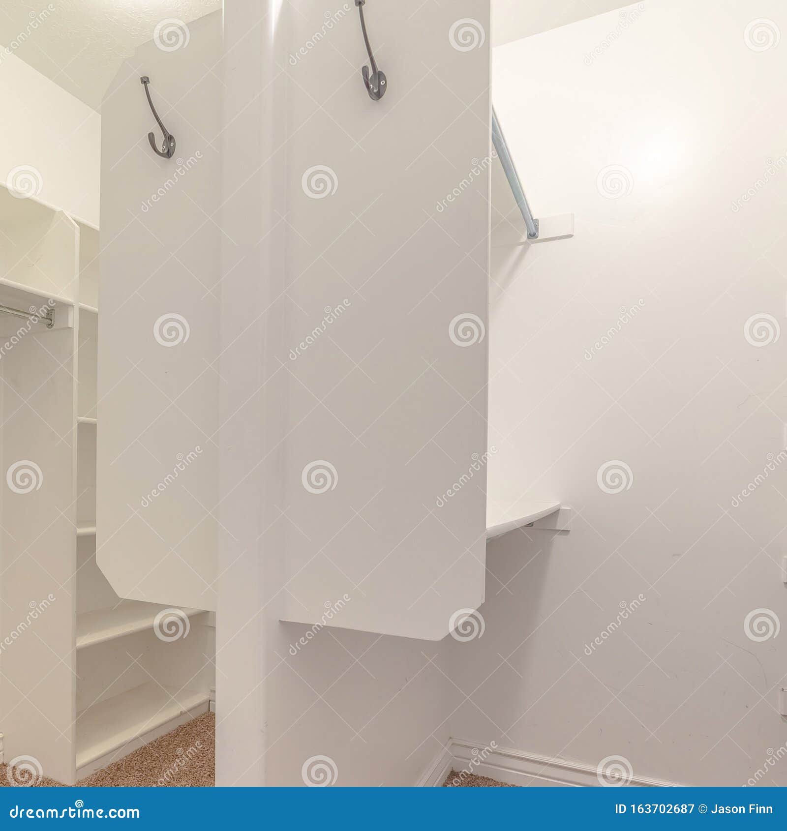 Square Frame Interior of a Dual Walk in Wardrobe Stock Image - Image of ...