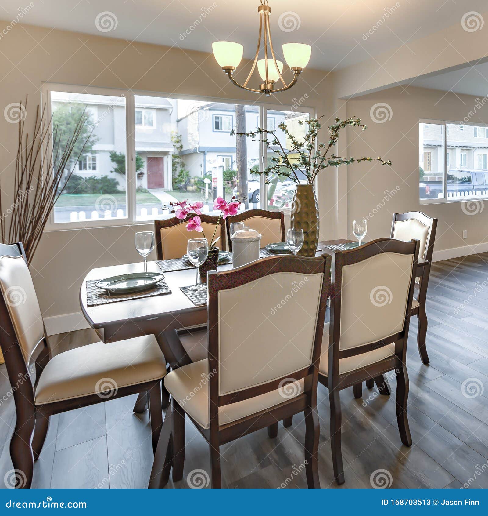 Square Frame Kitchen Table in Model Home with Twilight Tones Stock ...