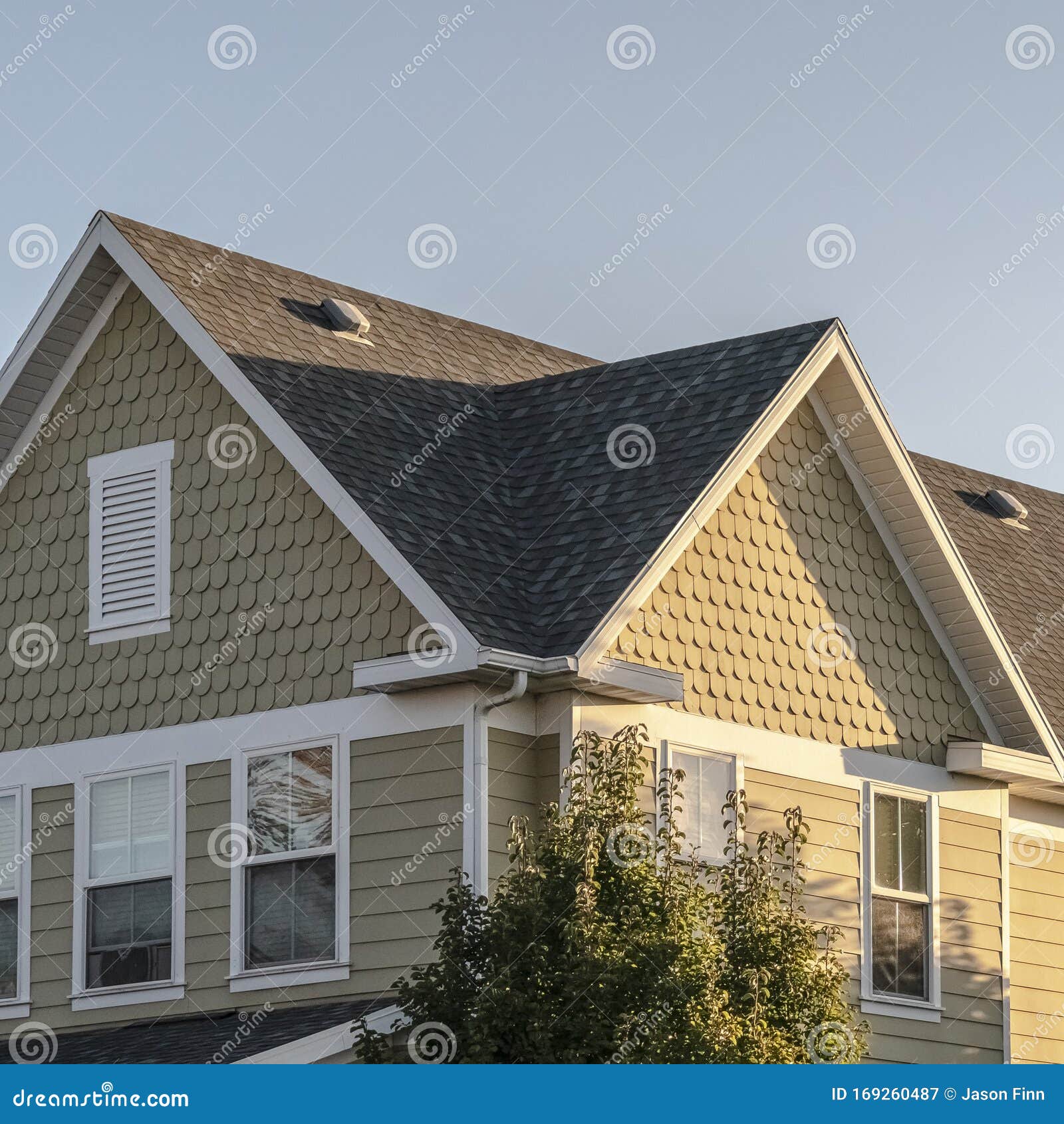 Square Frame Modern Timber Clad House with Textured Wall Stock Image ...