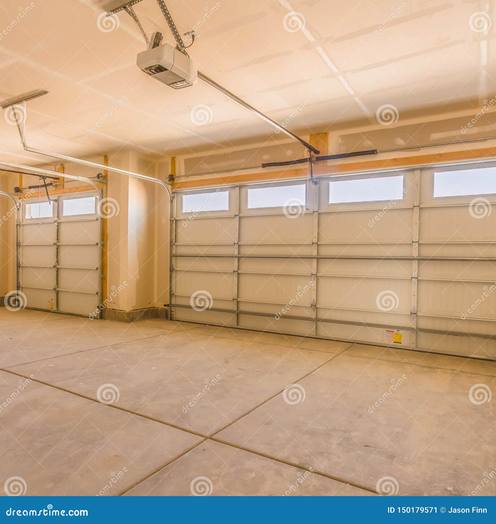 Square Interior of an Unfinished Garage with Unpainted Walls and ...