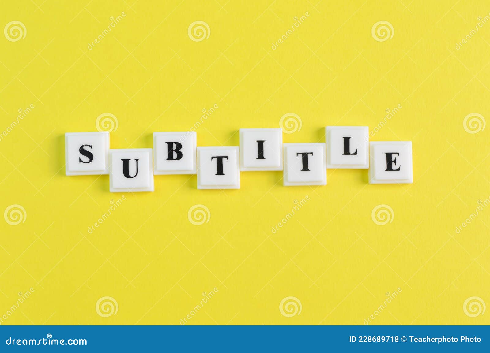 Square Letters with Text SUBTITLE Isolated on a Yellow Background Stock ...