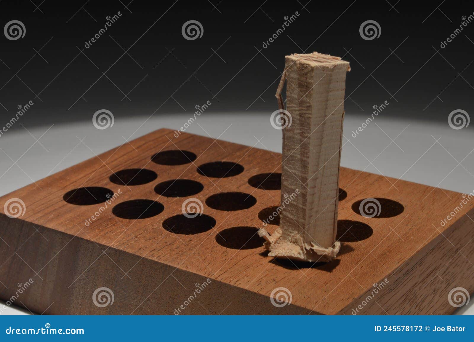Square peg in a round hole stock photo. Image of adage - 245578172