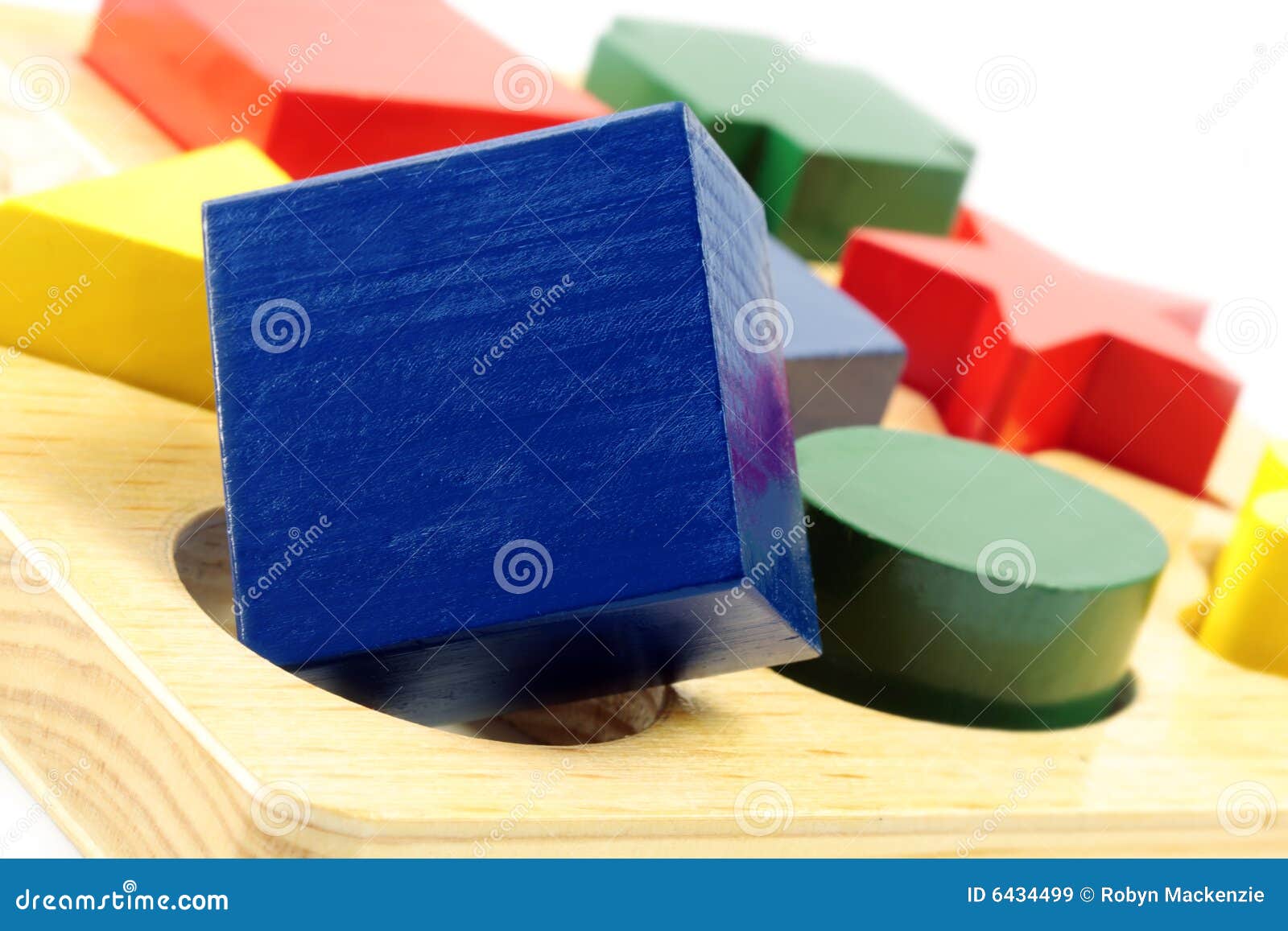 Square Peg in a Round Hole stock image. Image of wooden - 6434499