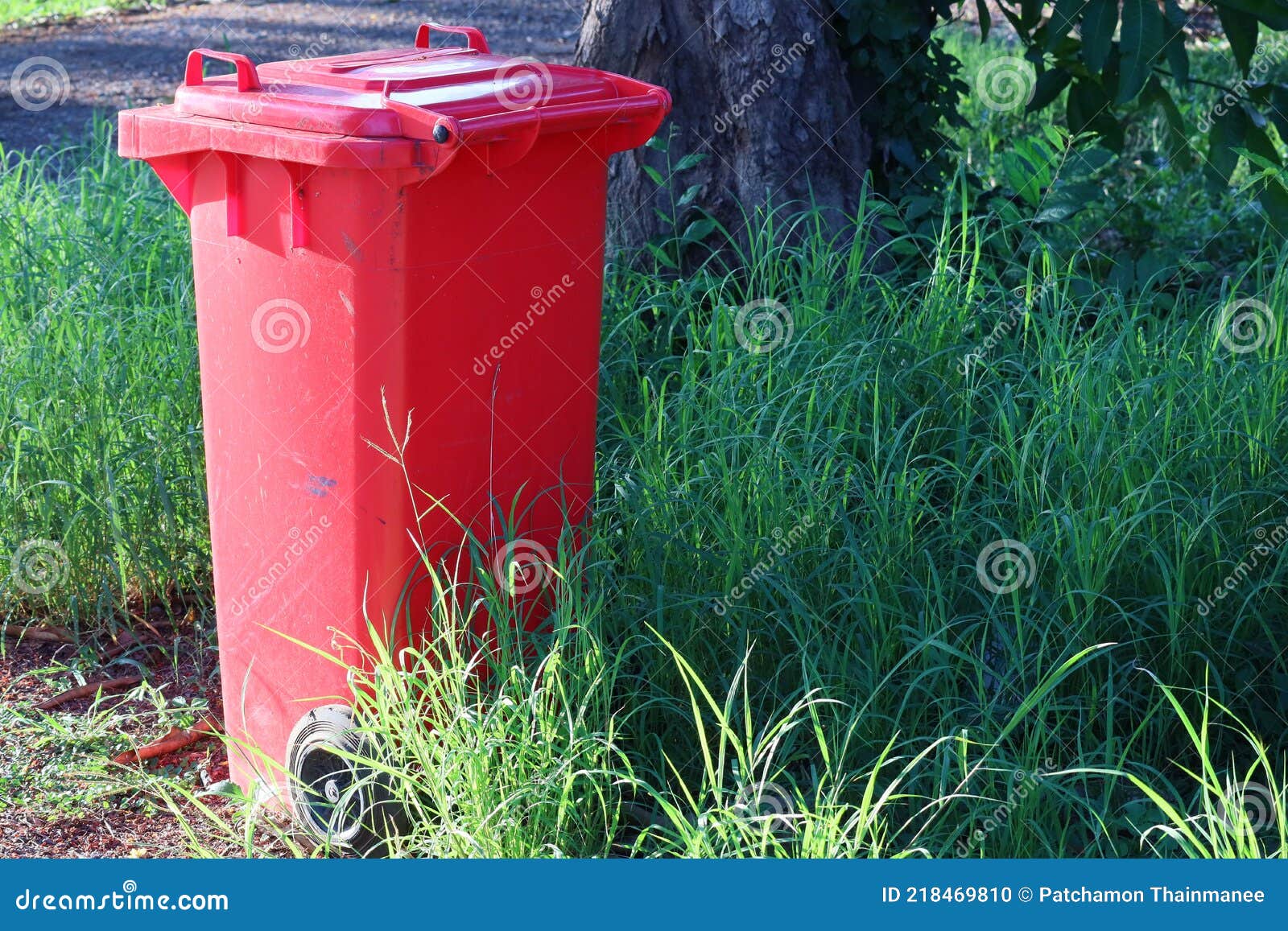 Square Red Plastic Large Trash Can Stand on Outdoor Public Road Floor ...