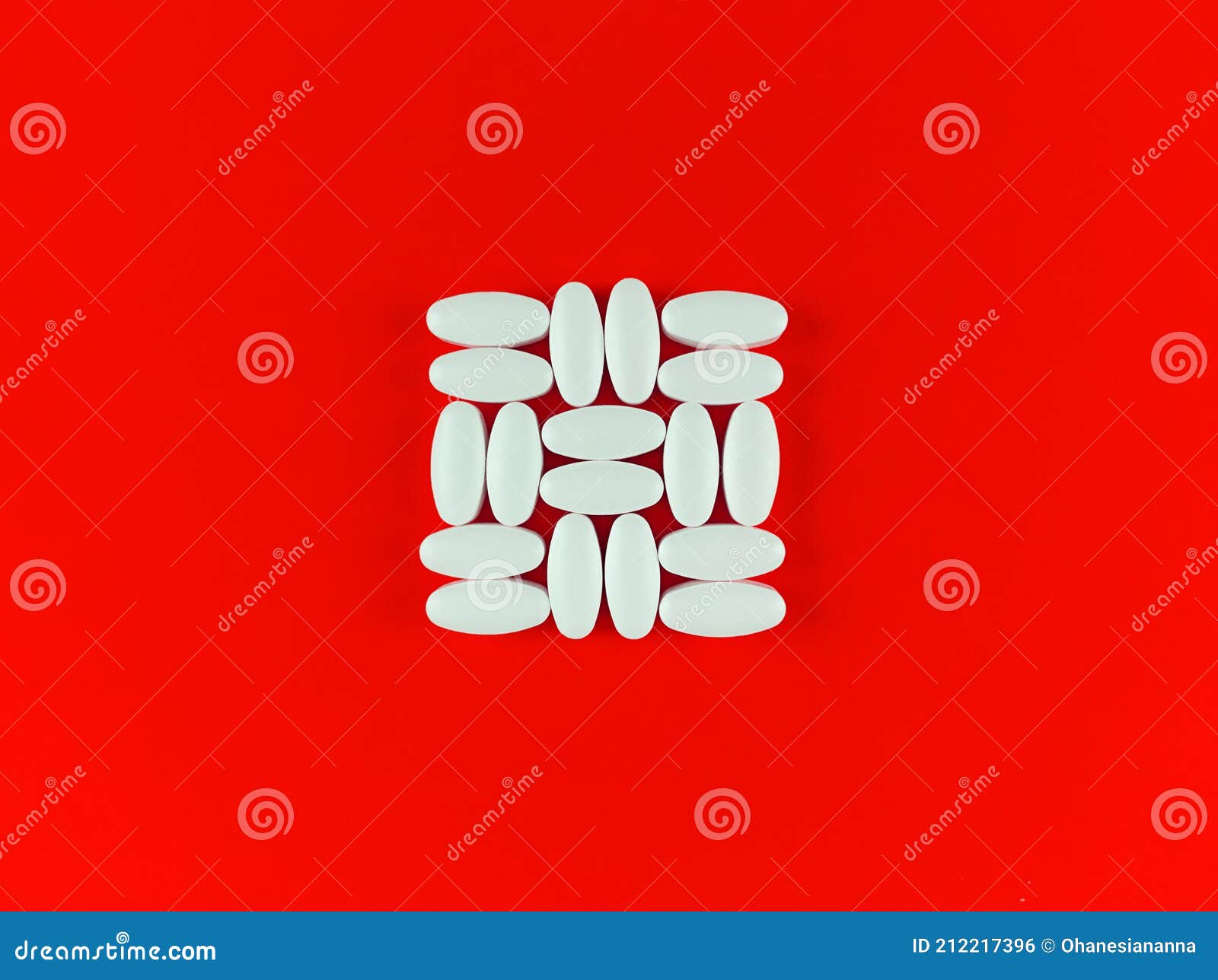 Square Shape Made from White Tablets on Red Backdrop Stock Photo ...