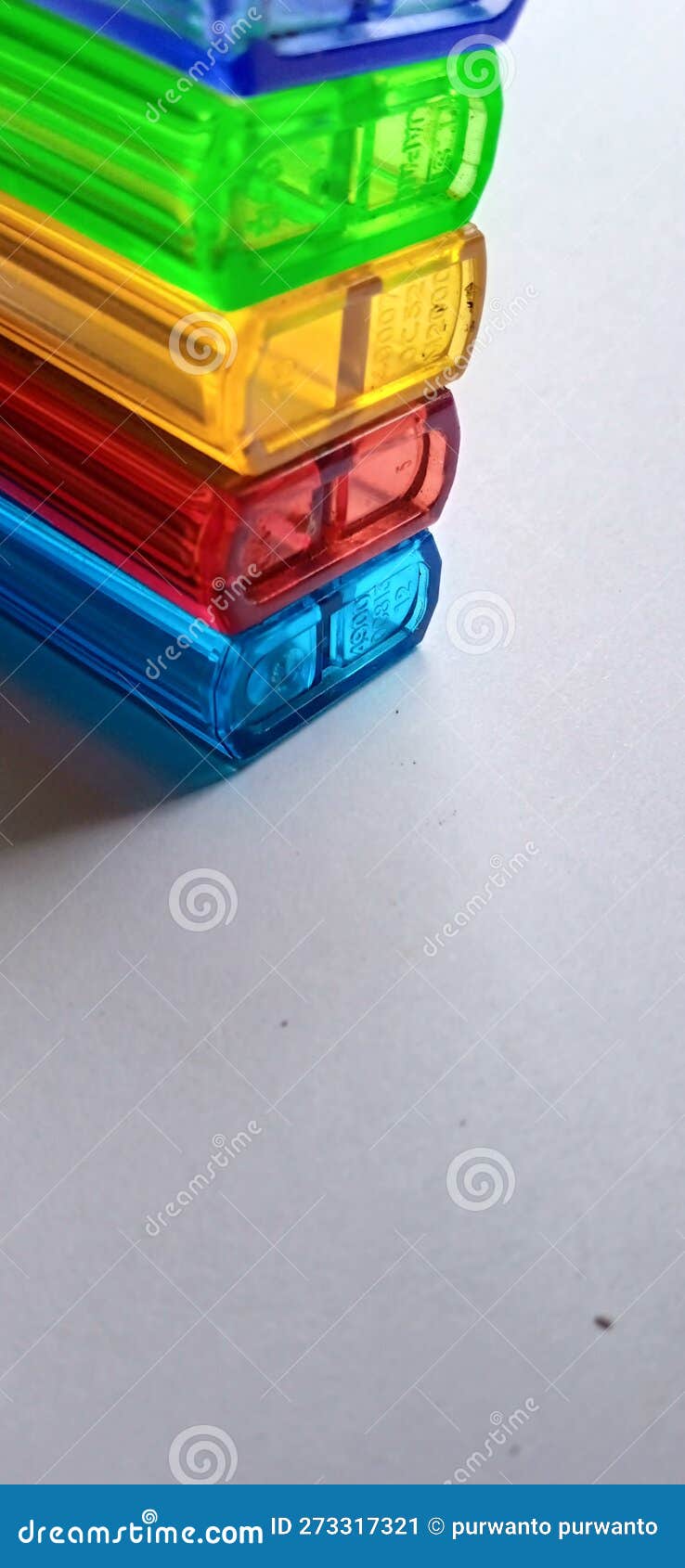 A Square Shape of a Pile of Gas Lighters of Different Colors Stock ...
