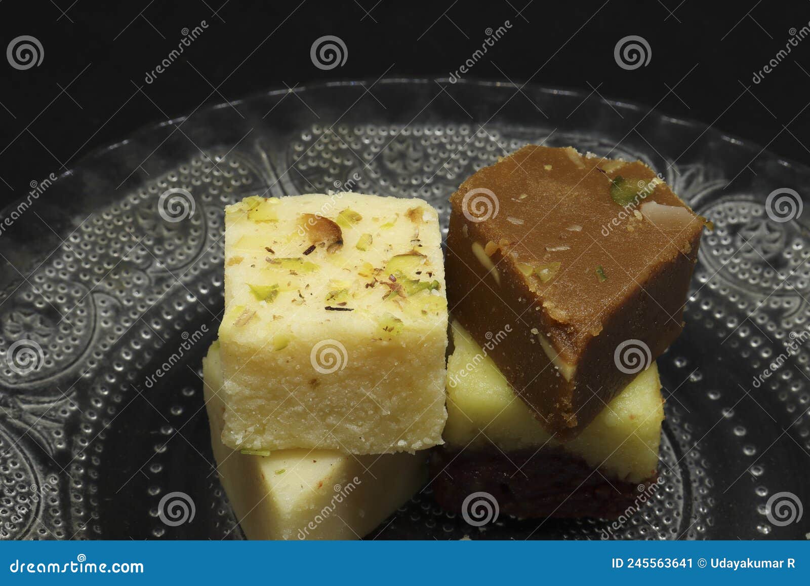 Square Shape Sweets in a Plate. on a Black Background Stock Image ...