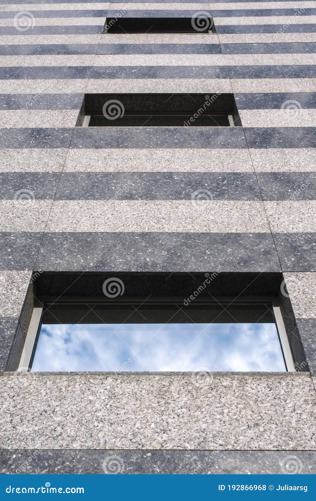 3 Square Shape Windows with Clouds Reflection on Striped Building Wall ...