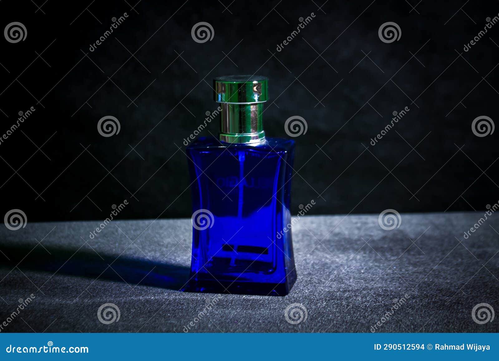 Square Shaped Blue Glass Perfume Bottle Stock Photo - Image of purple ...