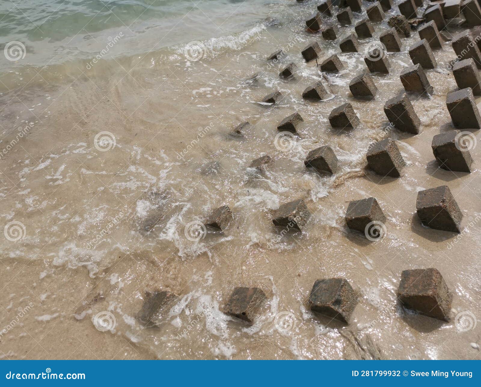 Square-shaped Concrete Coastal Wave Blocker by the Seaside Stock Photo ...