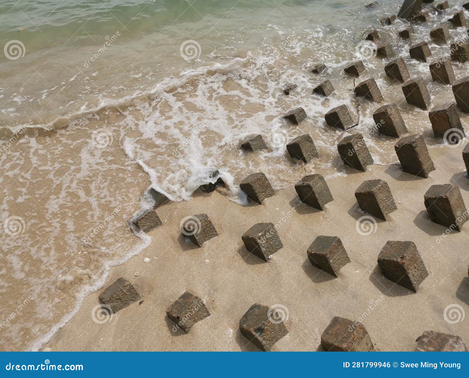 Square-shaped Concrete Coastal Wave Blocker by the Seaside Stock Photo ...