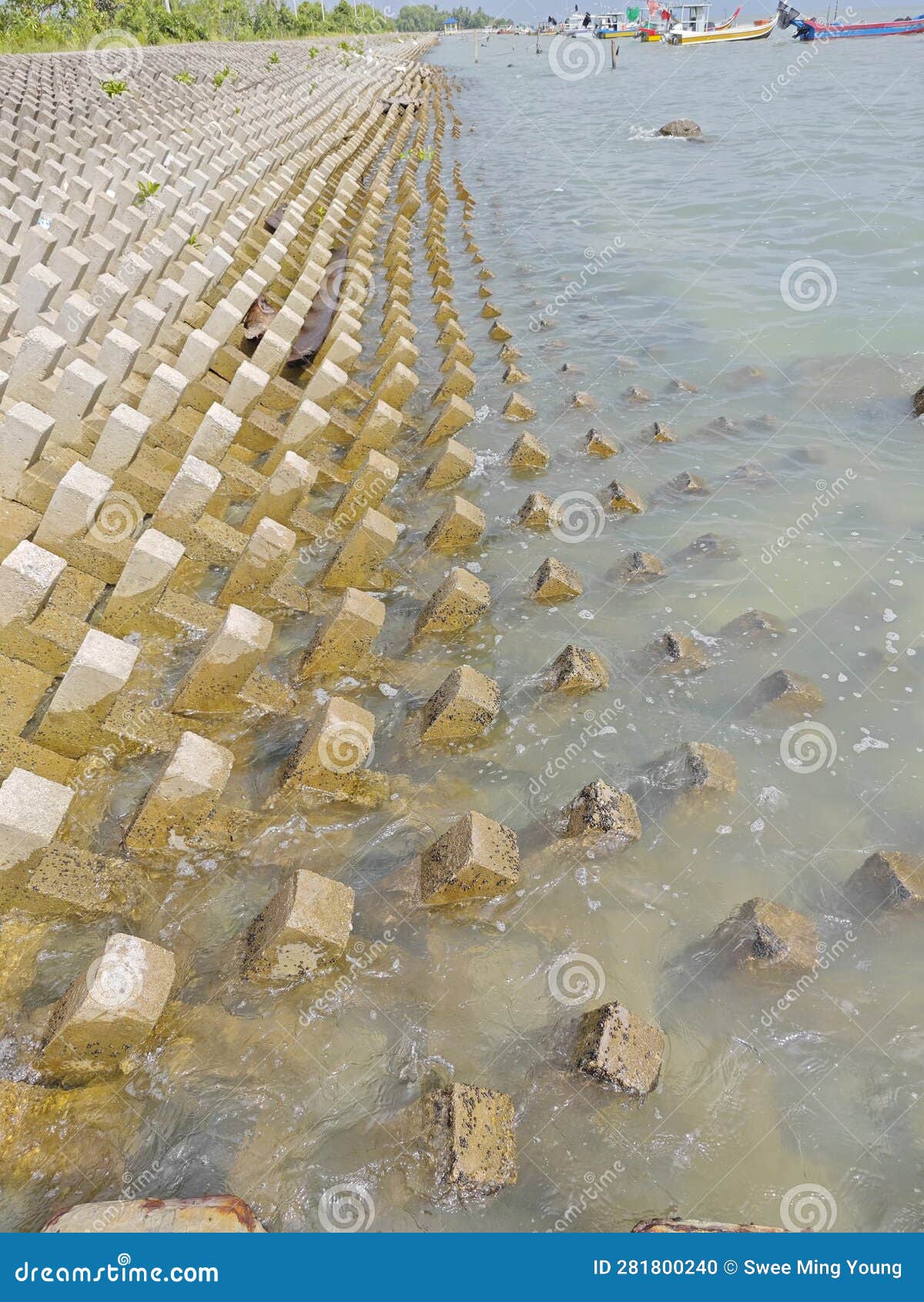 Square-shaped Concrete Coastal Wave Blocker by the Seaside Stock Photo ...