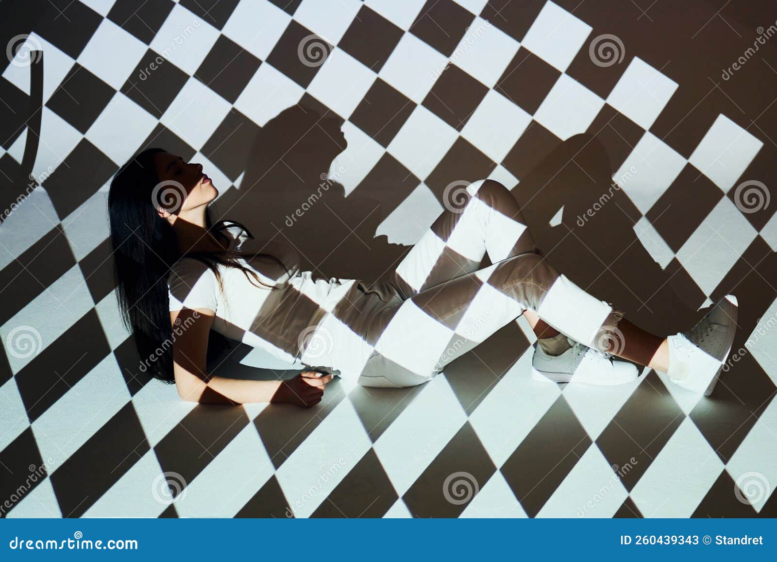 Square Shaped Lights. Beautiful Young Woman is in Projector in the ...