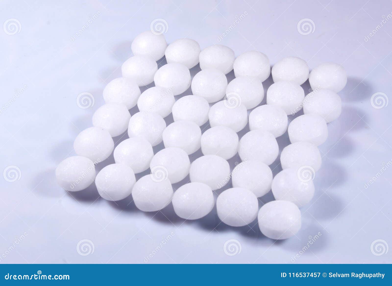 A Square Shaped Pile of White Naphthalene Balls. Stock Image - Image of ...