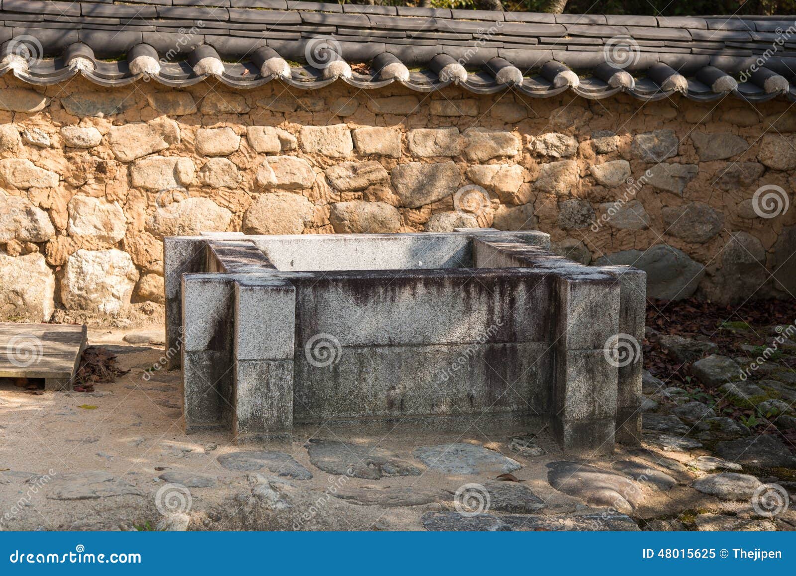 Square shaped stone well stock image. Image of stone - 48015625