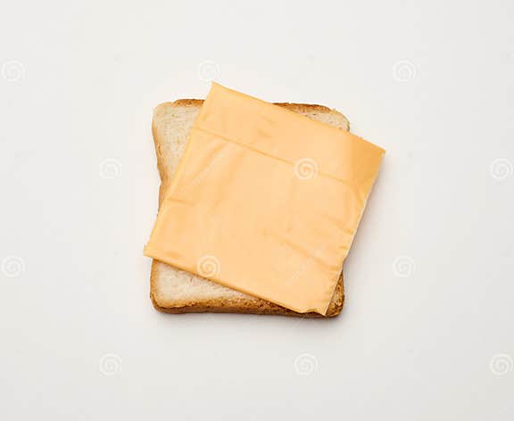 Square Slices Of Toasted Bread Made From White Wheat Flour And A Slice