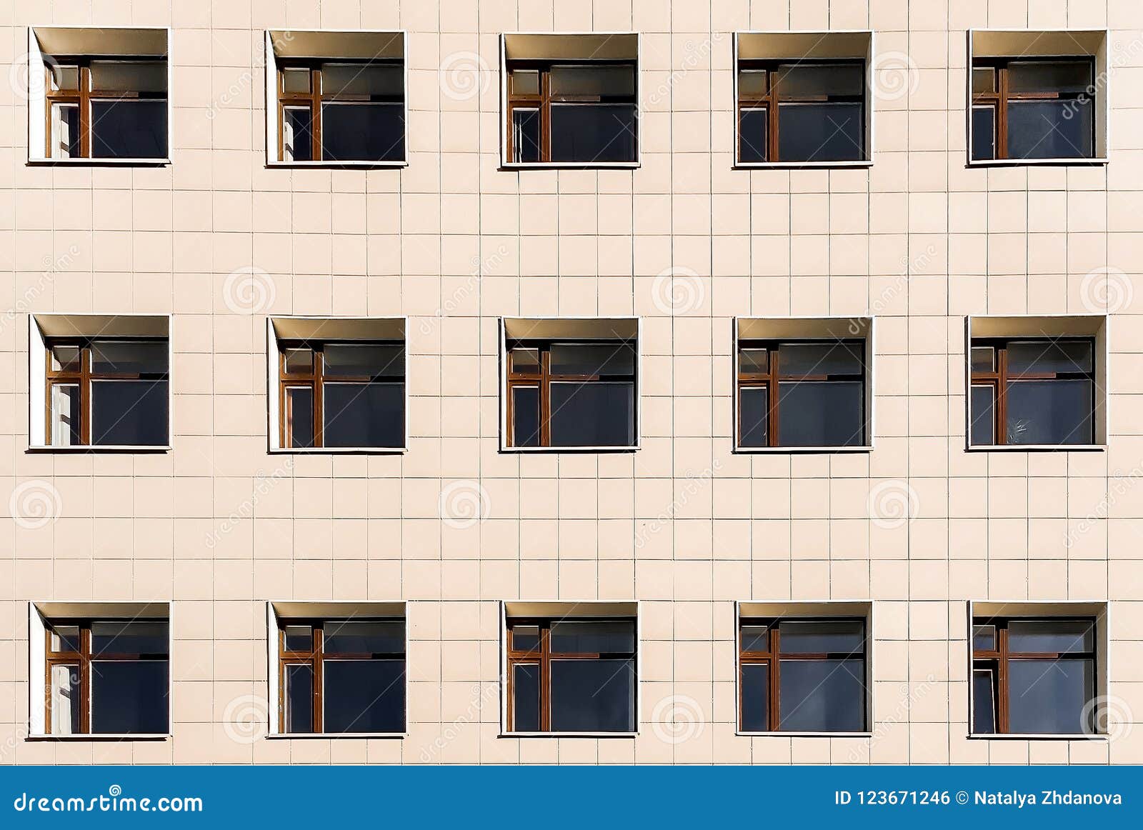 Square Windows of the Building on a Yellow Background, Lots of Windows ...