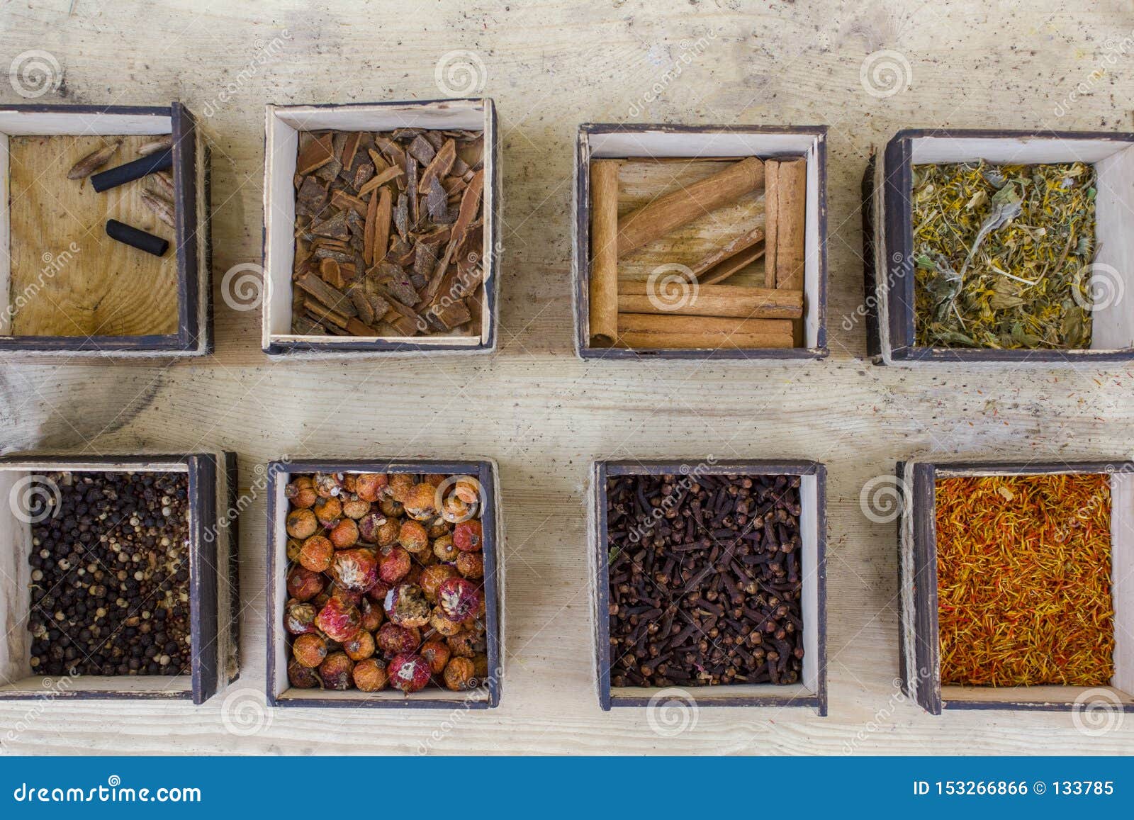 Square Wooden Boxes with Various Bright Multi-colored Spices on the ...