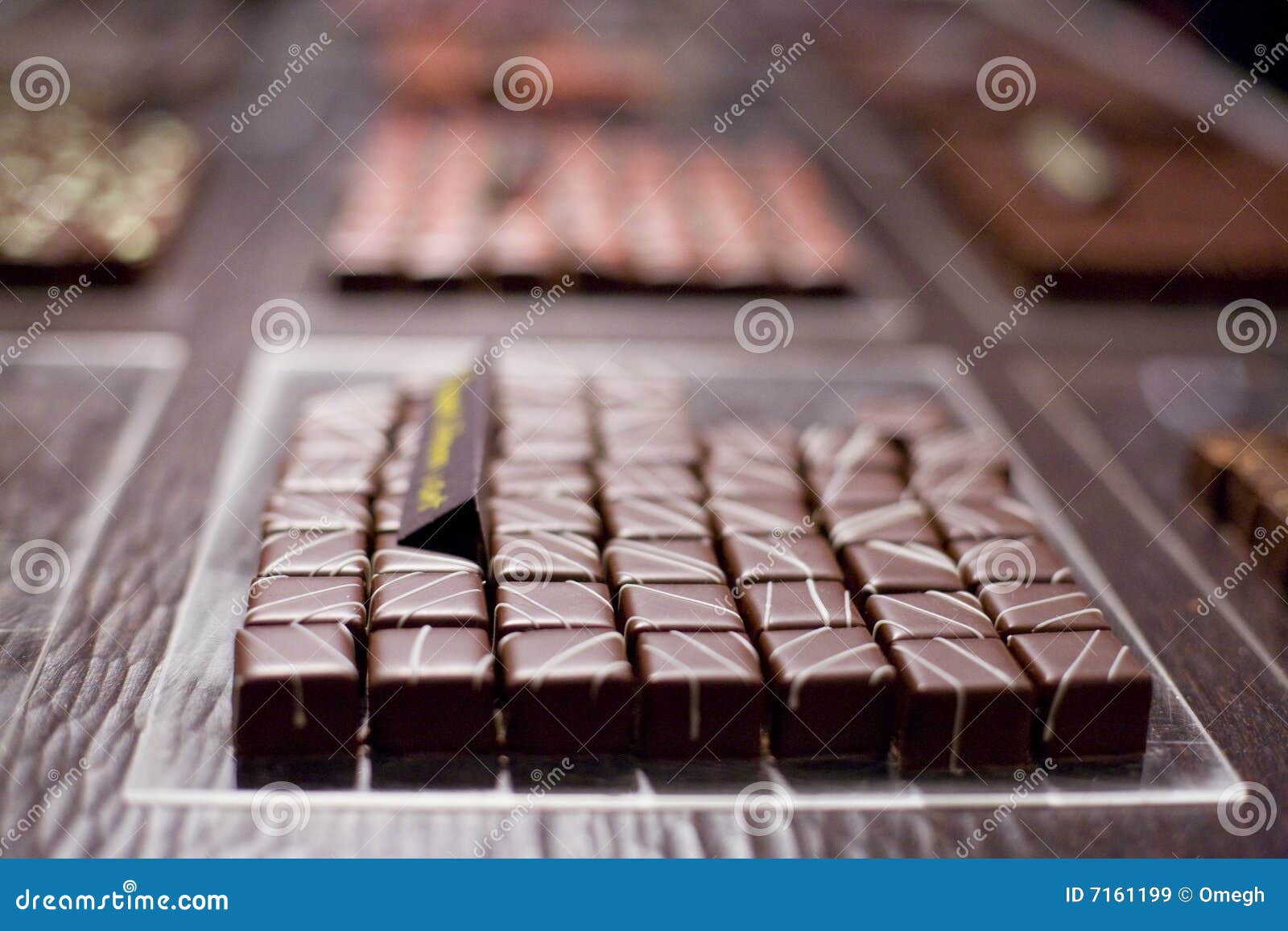 Squared Pieces of Chocolate Stock Image - Image of choco, wood: 7161199