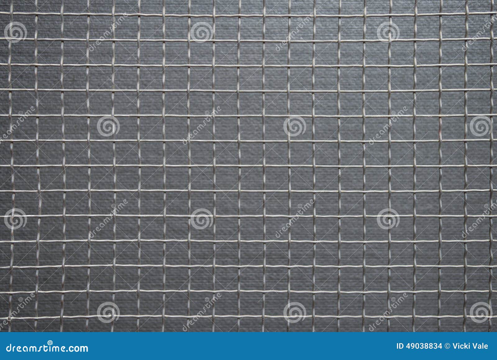 Squares of Wire Mesh Against Grey Background. Stock Photo - Image of ...