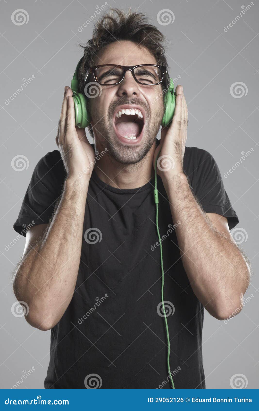 Squealing Boy with Headphones Stock Photo - Image of expressive, adult ...