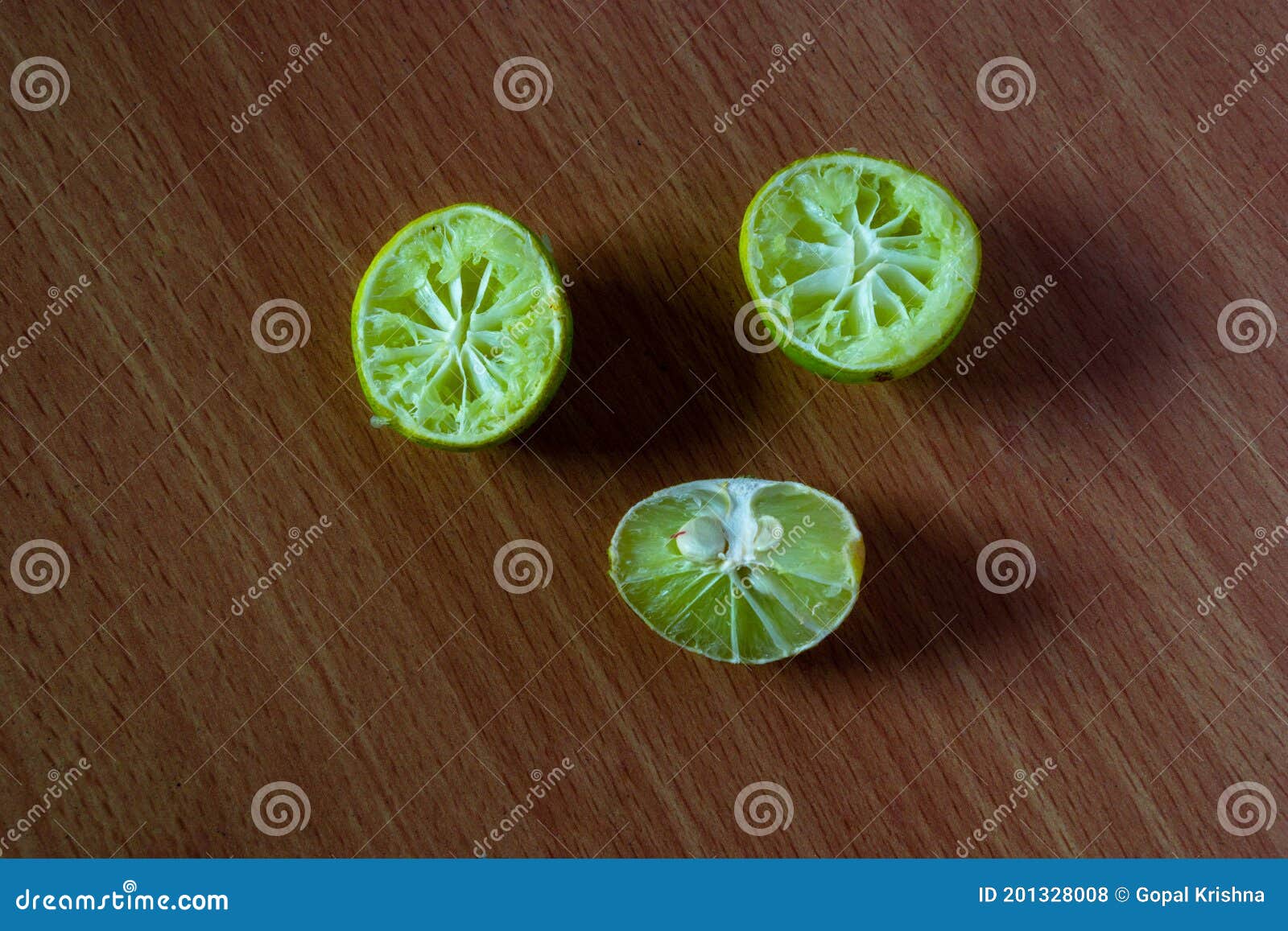 Squeezed Lemon Pieces on the Table Stock Photo - Image of background ...