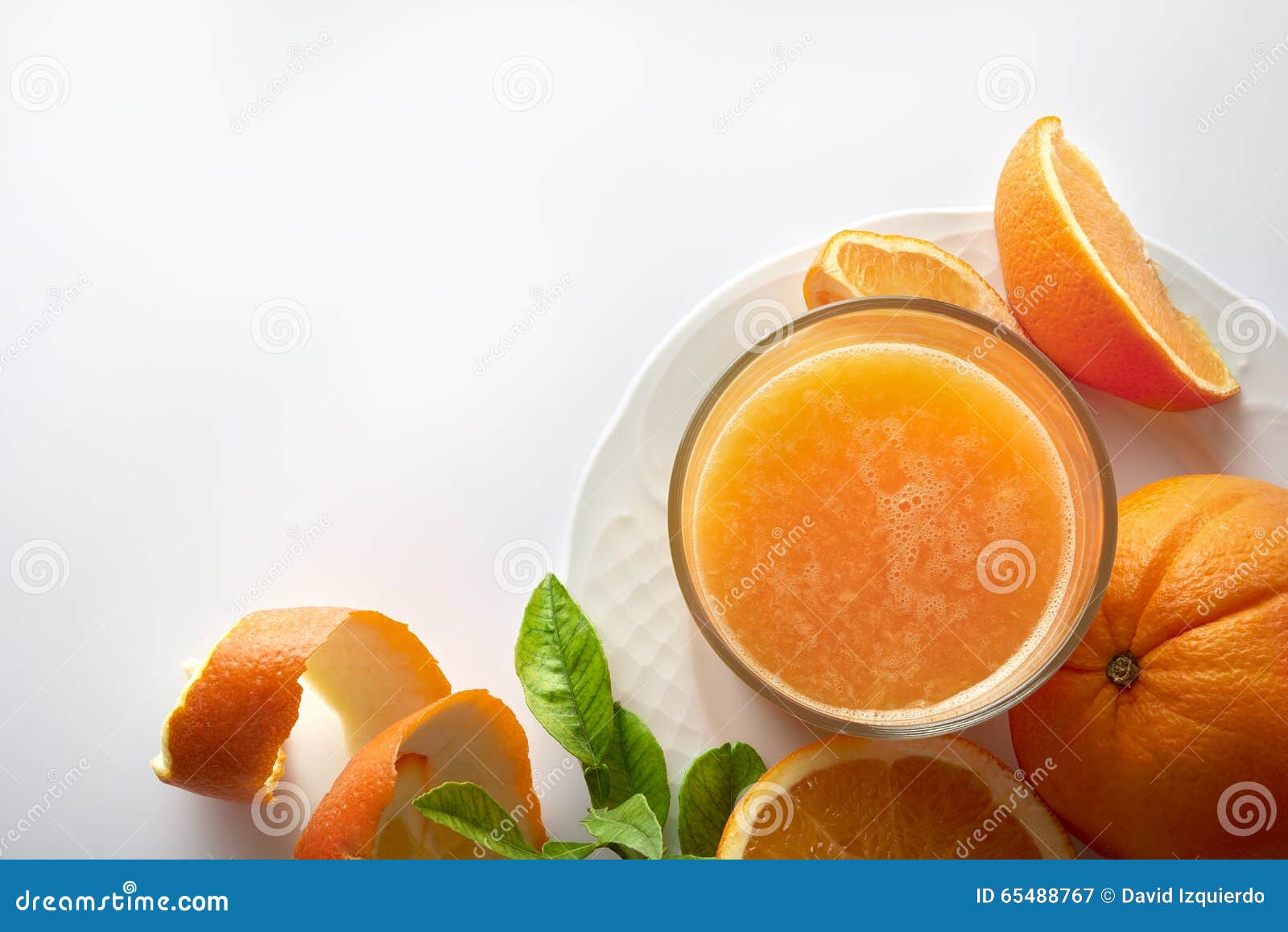 Squeezed Orange Juice in a Glass on Plate Top View Stock Image - Image ...
