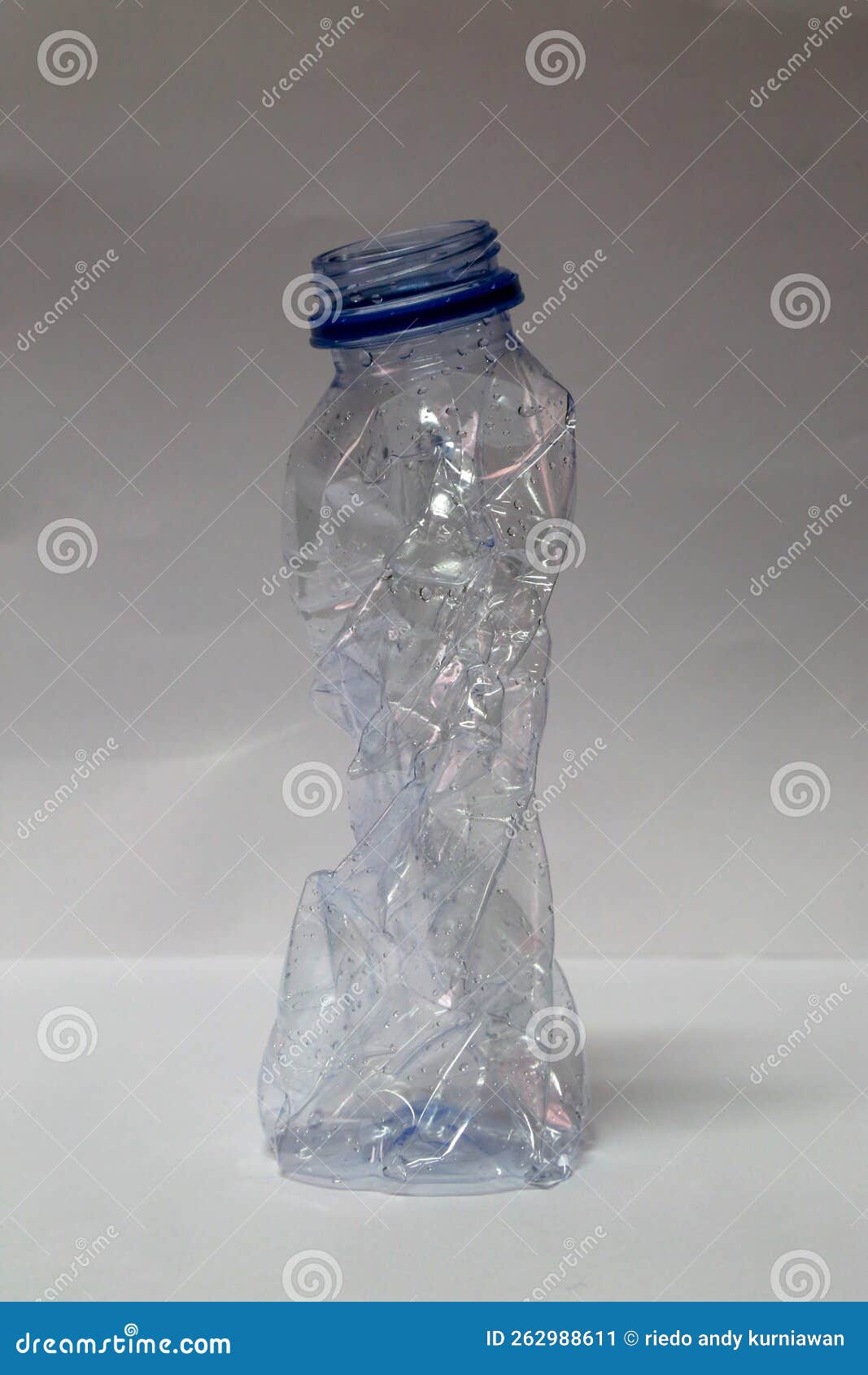 Squeezed Used Drinking Water Bottles with White Background Stock Image ...