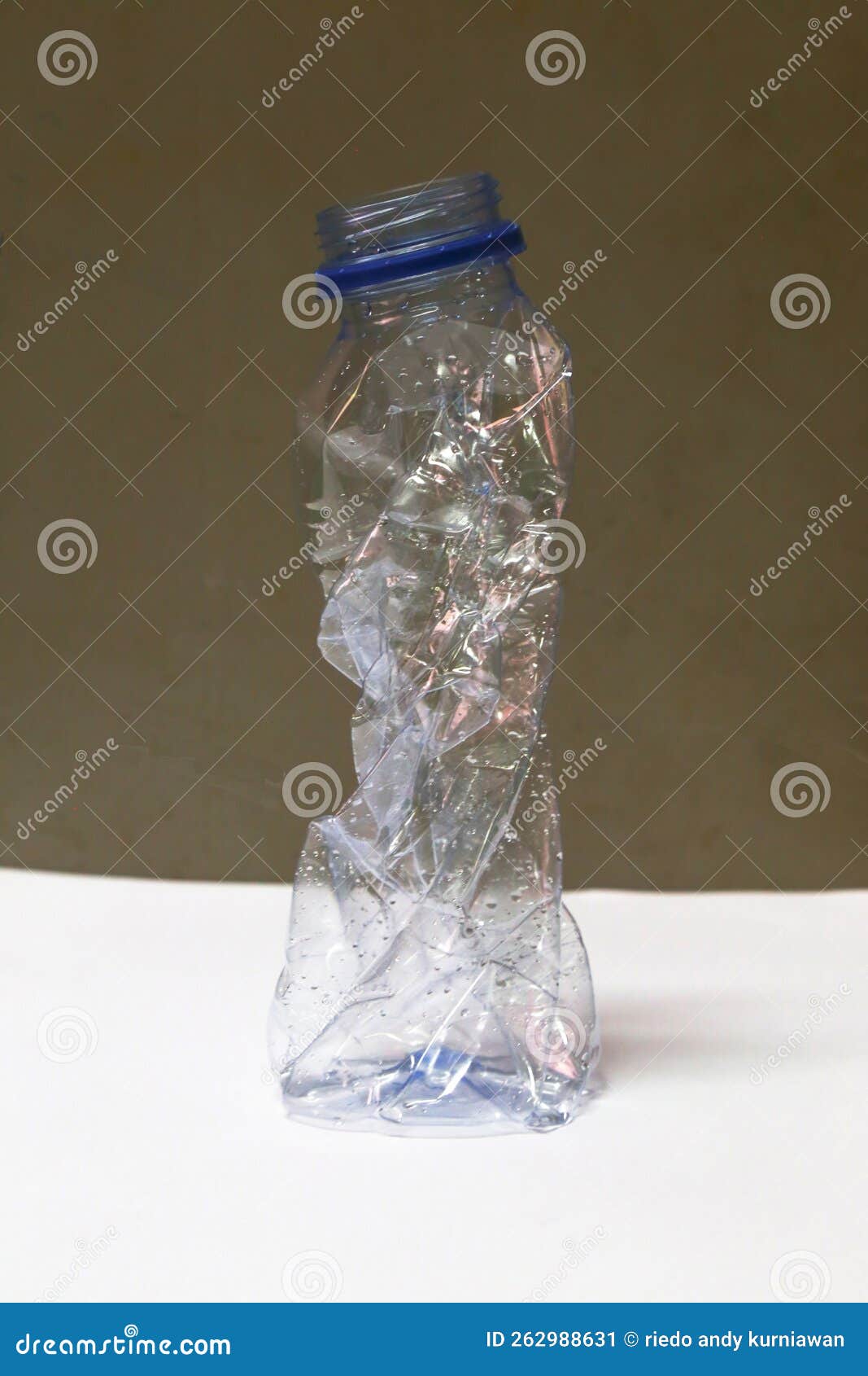Squeezed Used Drinking Water Bottles with White Background Stock Image ...