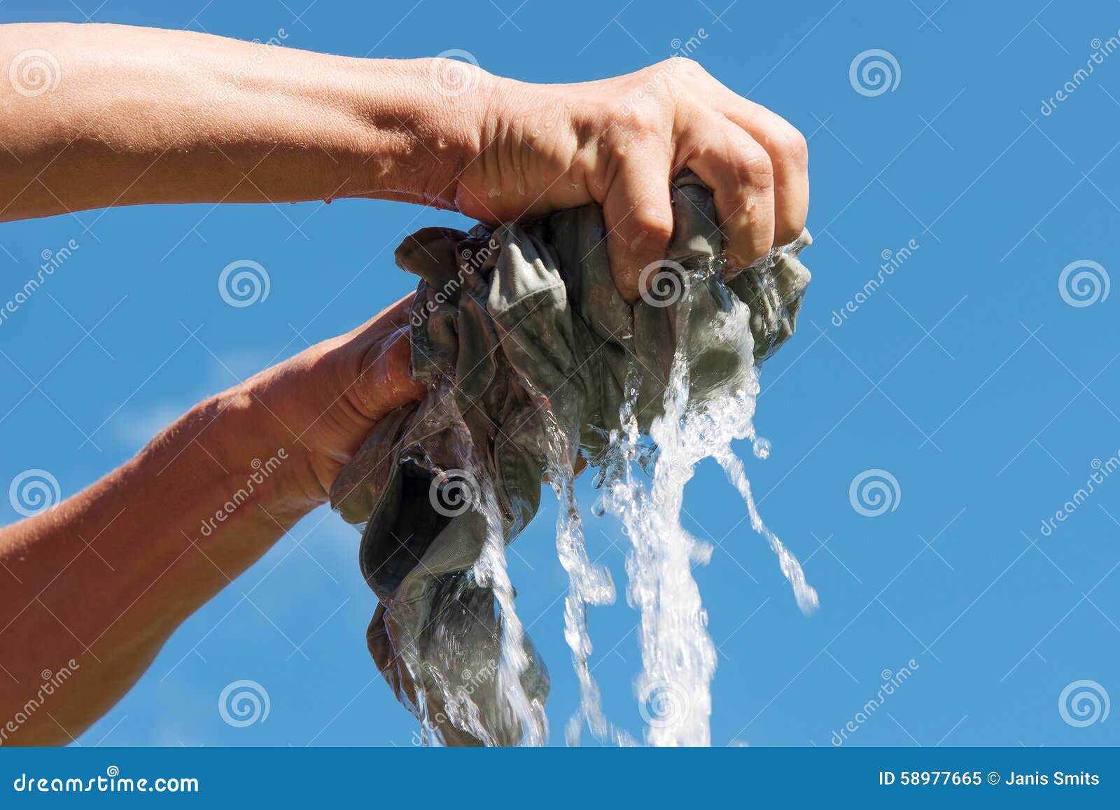 Squeezing of cloth. stock image. Image of laundry, wind - 58977665