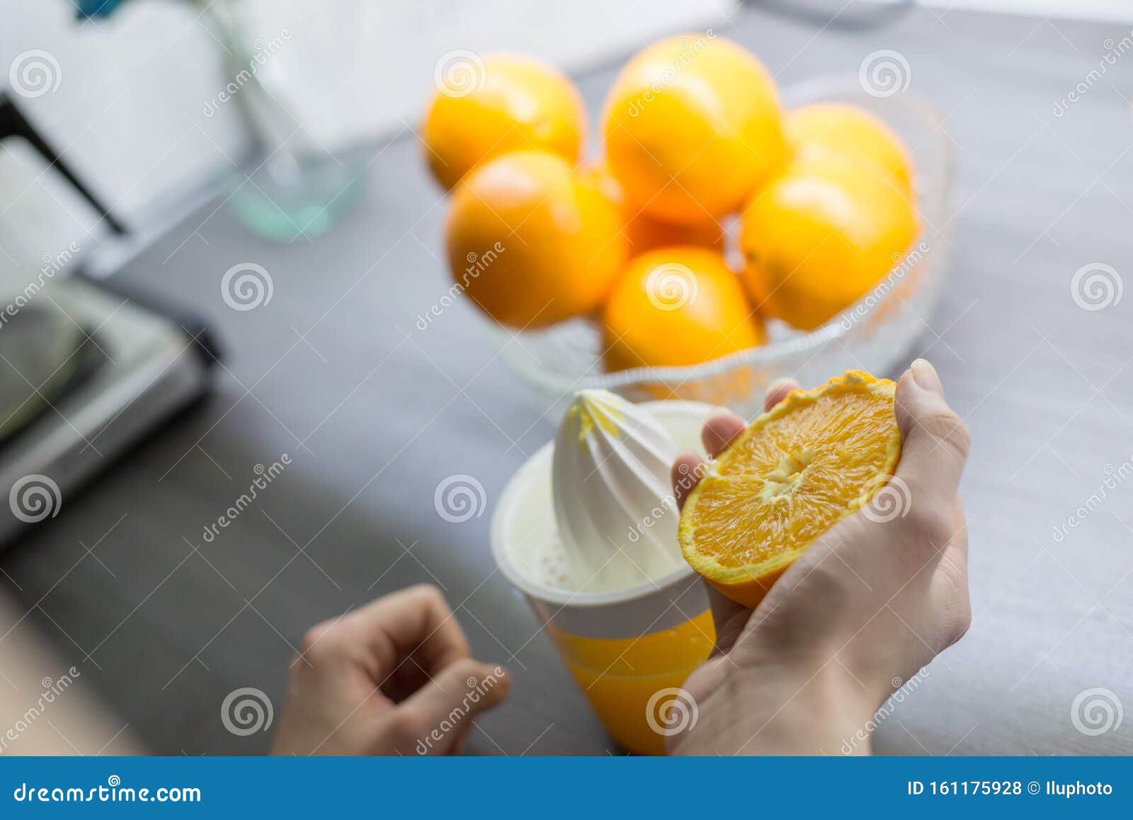 Squeezing Orange Juice by Hand Stock Photo - Image of breakfast ...