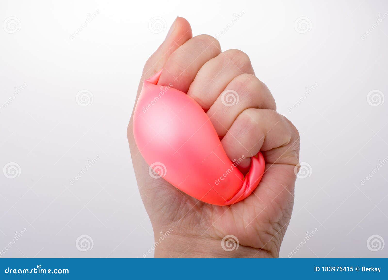 Squeezing Pink Balloon with Hand Stock Image - Image of anxious, pink ...